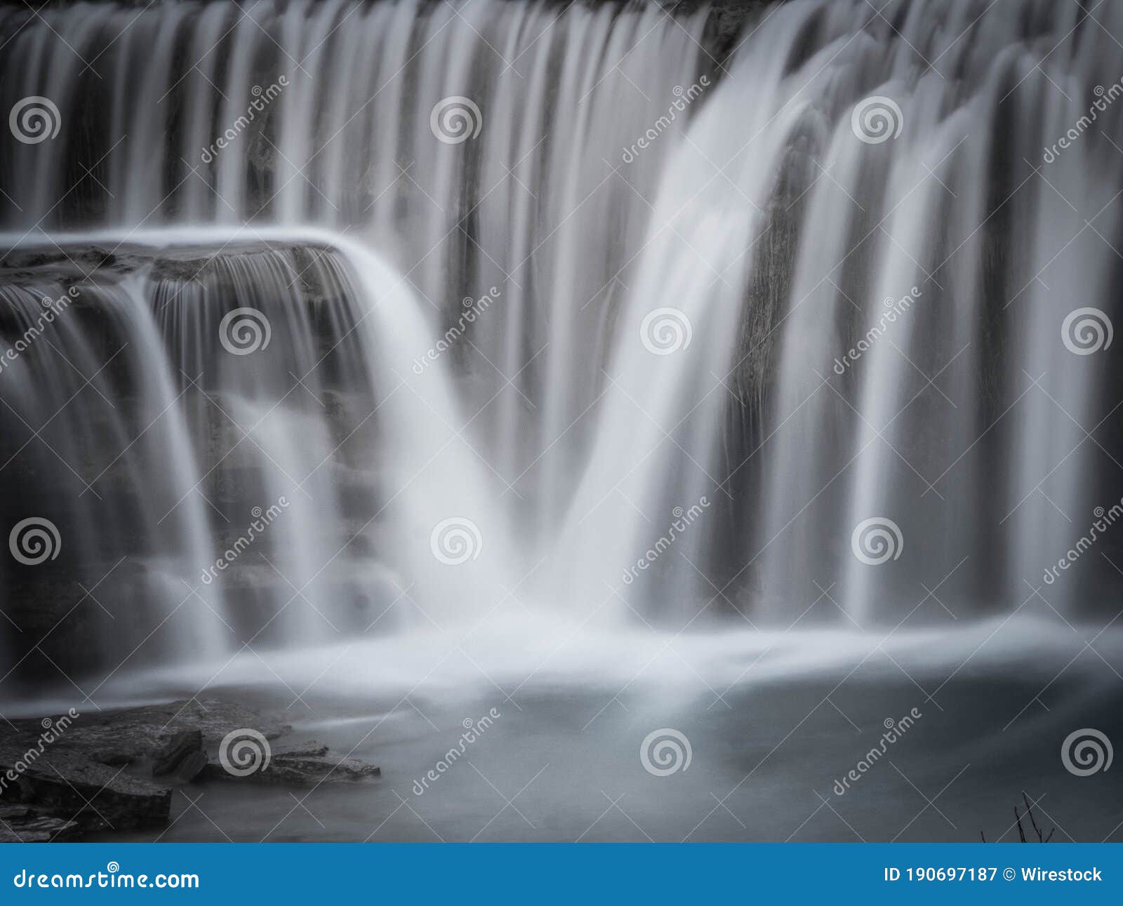 Breathtaking View of the Waterfall Falling Over the Calm and Beautiful ...