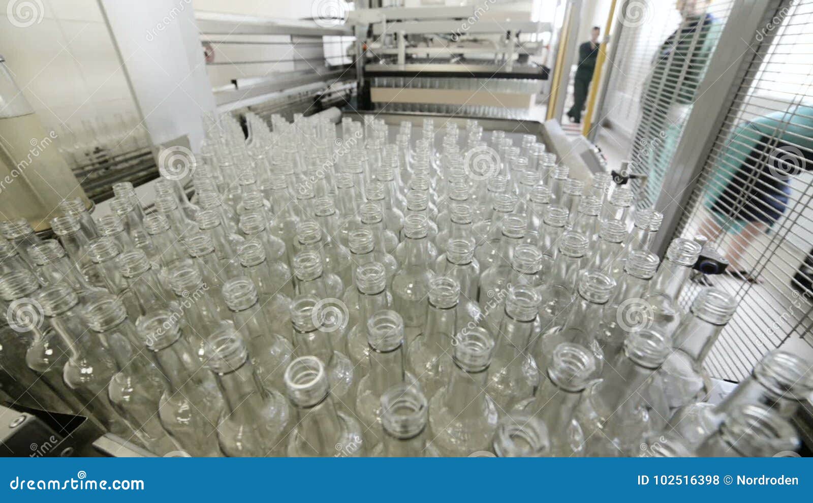 Unloading Glass Bottles with an Automatic Machine. Stock Footage ...