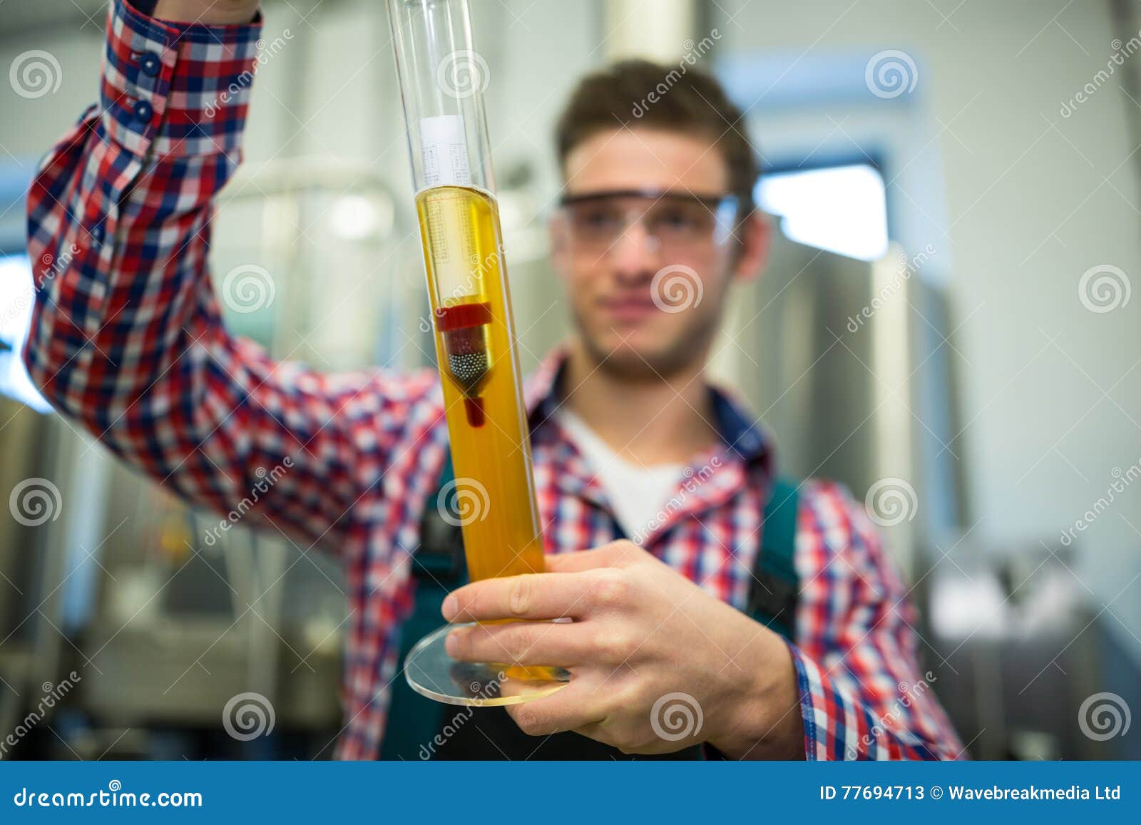 Brewer testing beer stock image. Image of examining, food - 77694713