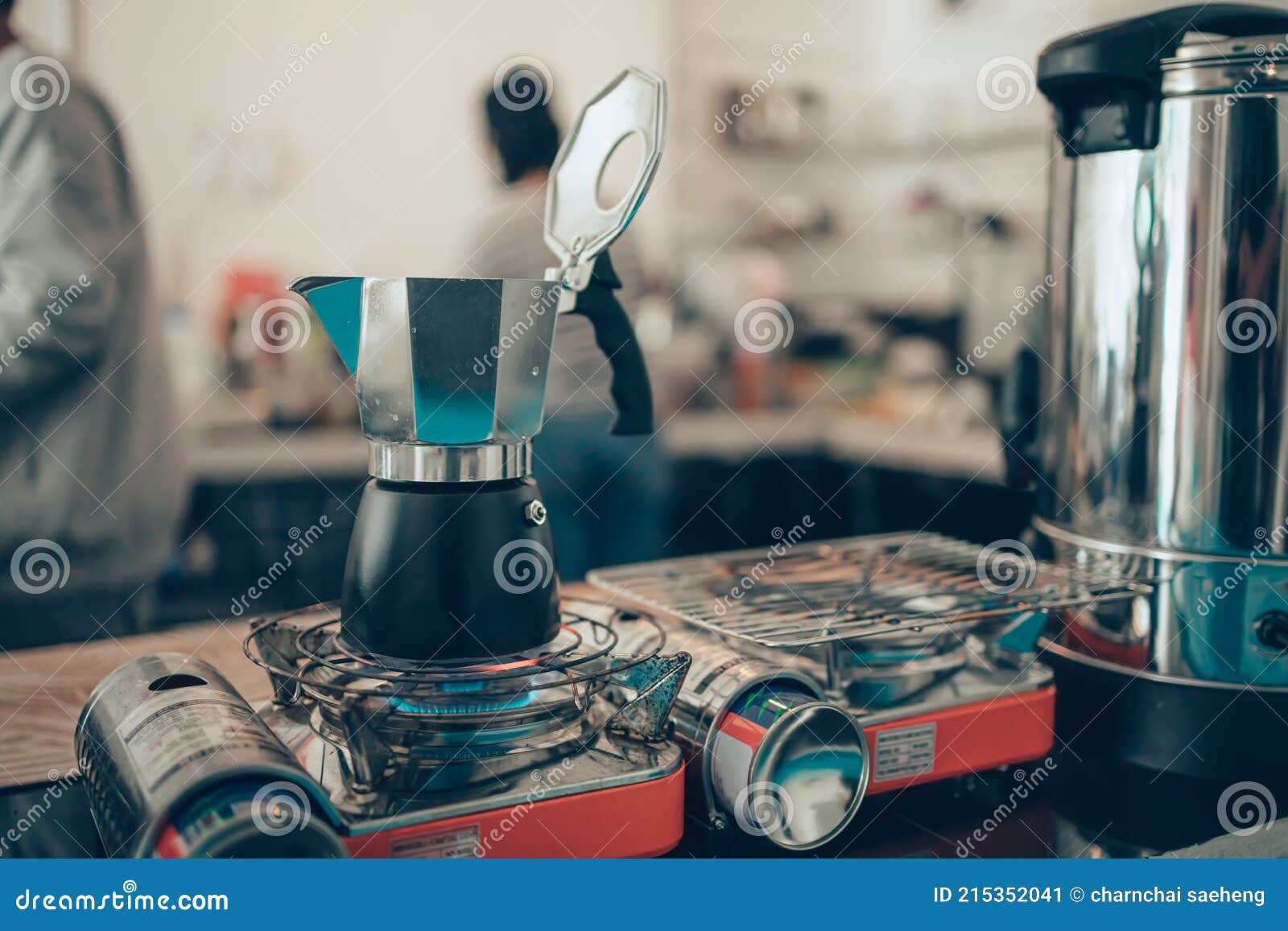 Brewing Black Moka Coffee Using Moka Coffee Maker and Boiling on Stove ...