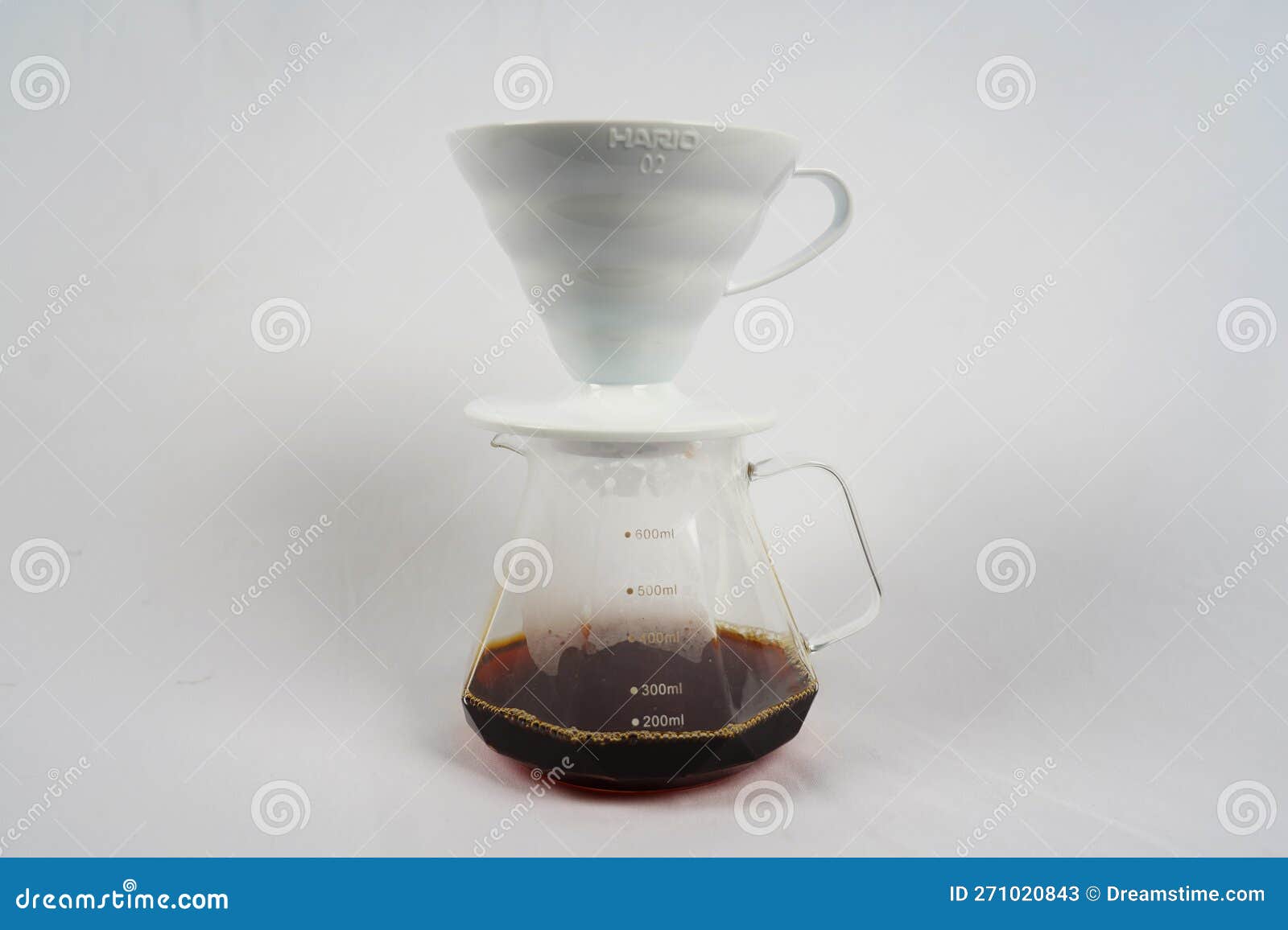 Brewing Coffee in a Funnel. the Hario V60 Coffee Funnel is on the ...