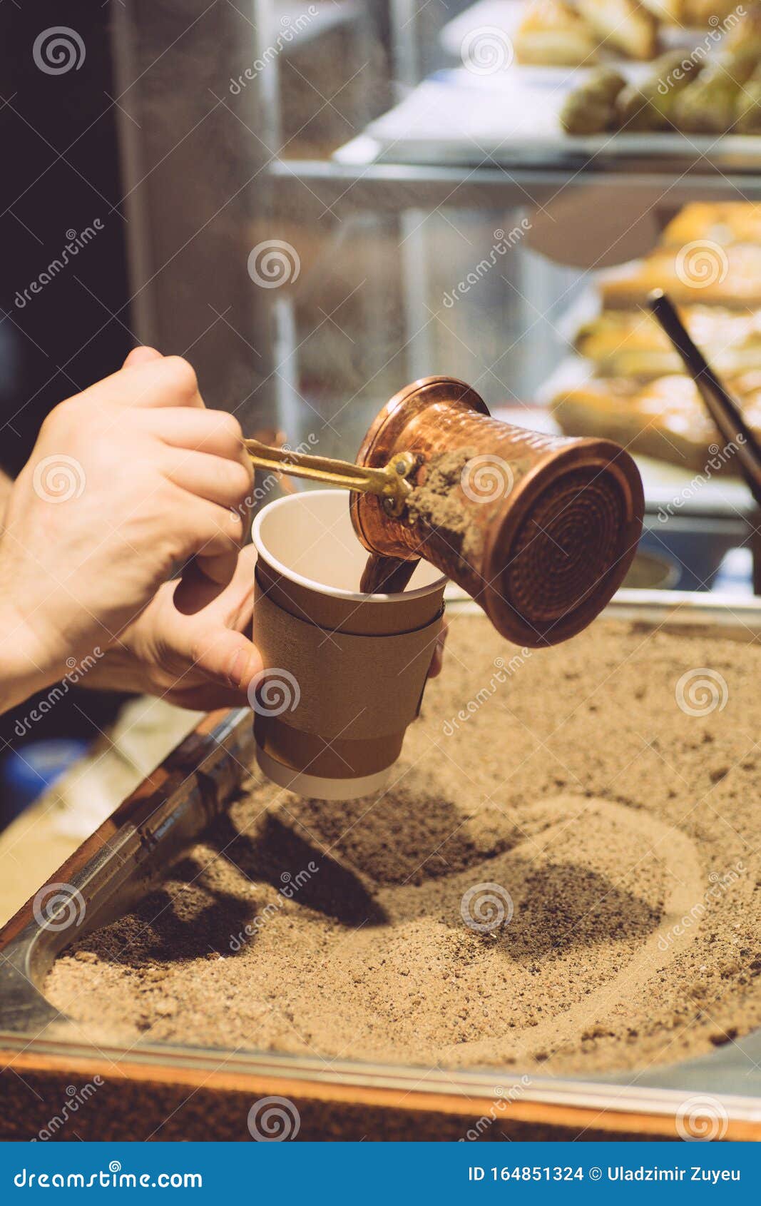 Brewing Turkish Coffee on Hot Sand. the Traditional Method of Making ...