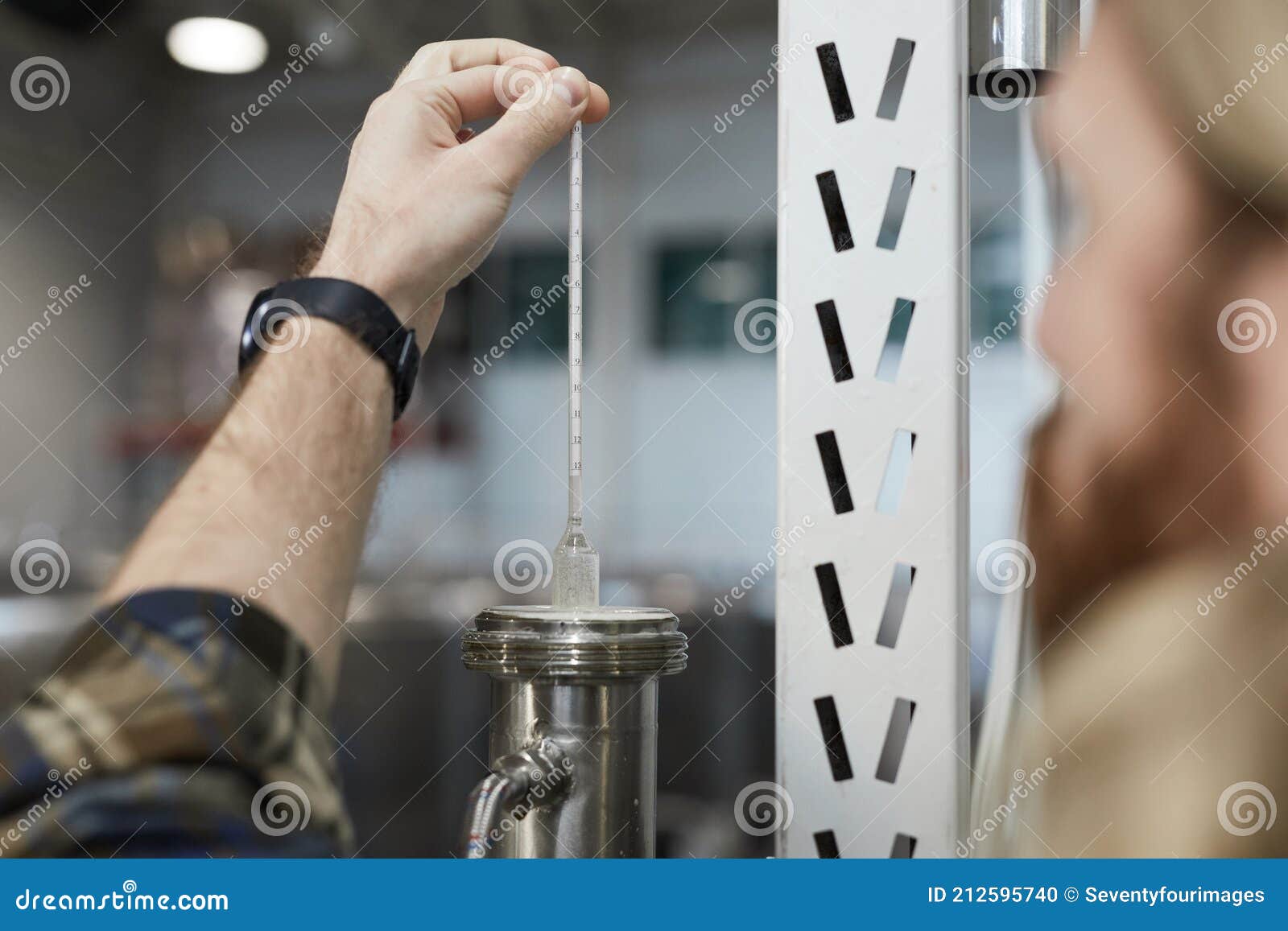 Brewmaster Using Alcometer stock photo. Image of industrial - 212595740