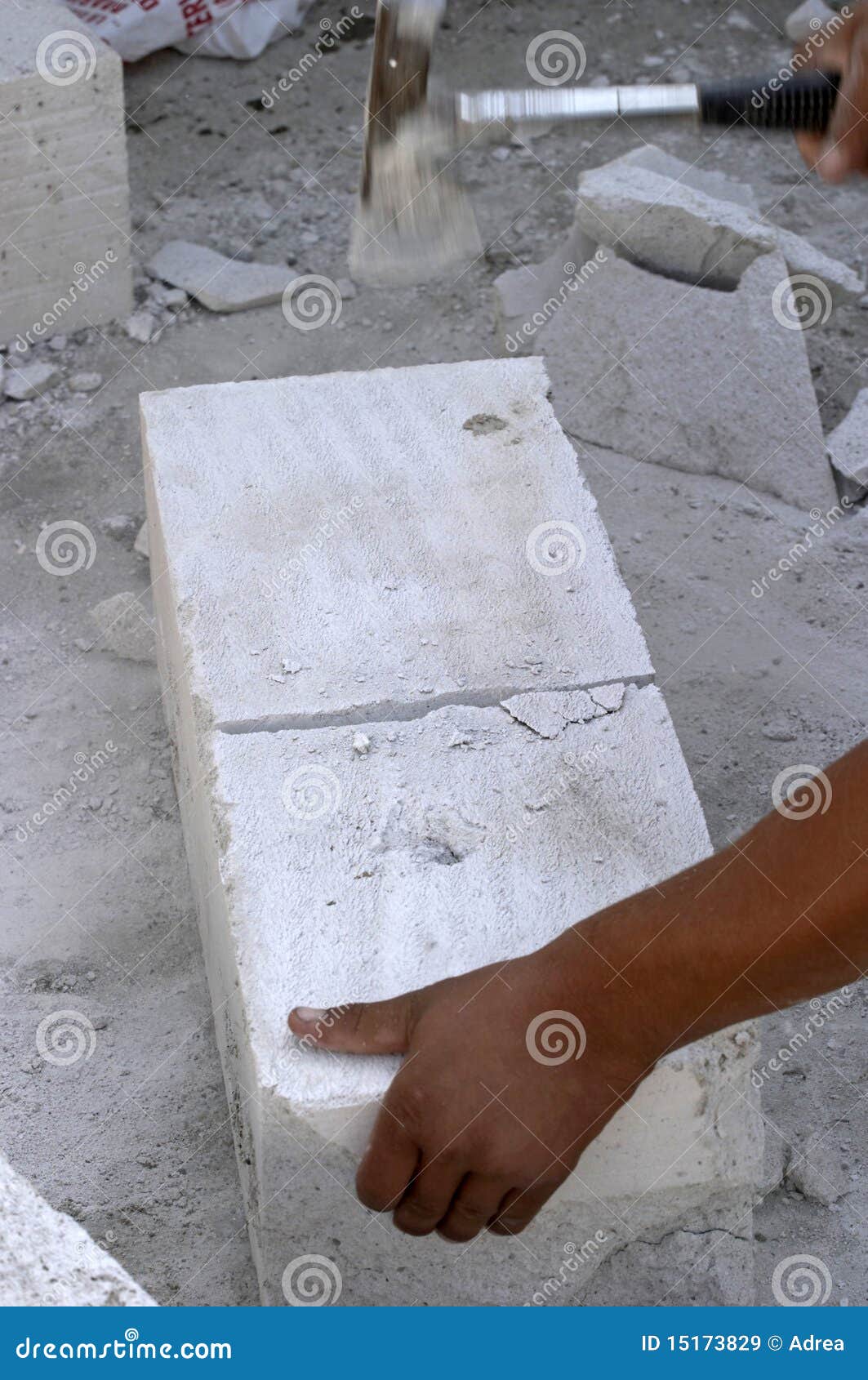 Man Breaking a Construction Brick Stock Image - Image of stones, work ...