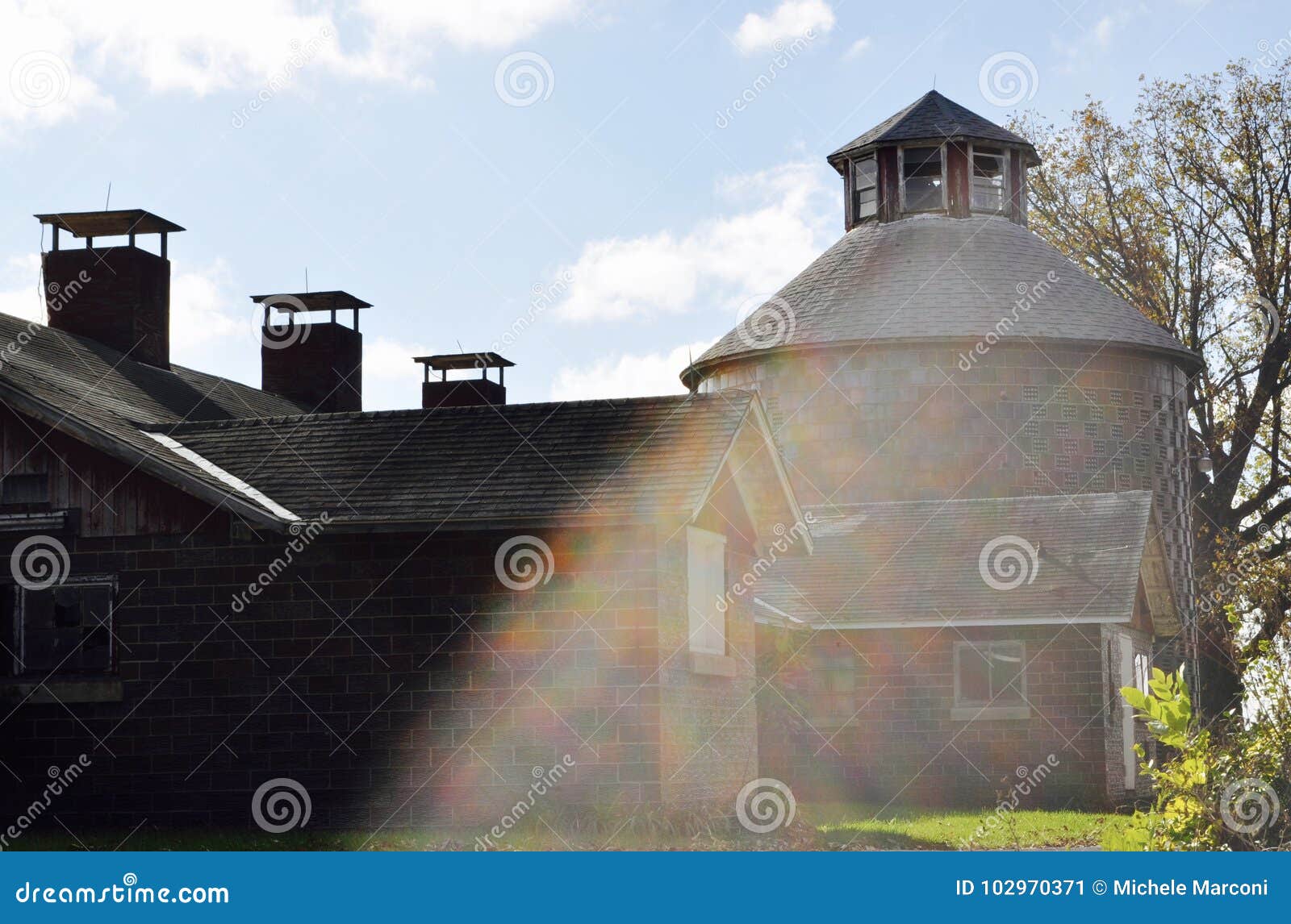 Barn and Silo with Cupola Full of Windows. Stock Image - Image of ...