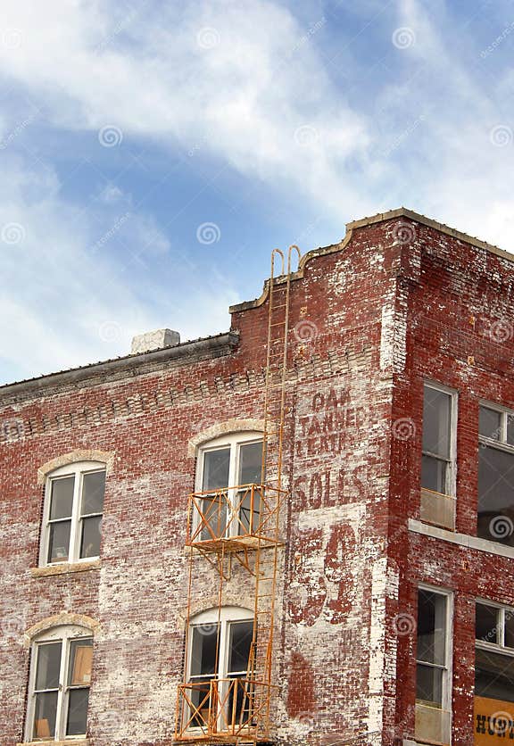 Brick Buidling Redo stock image. Image of downtown, scraping - 22181785