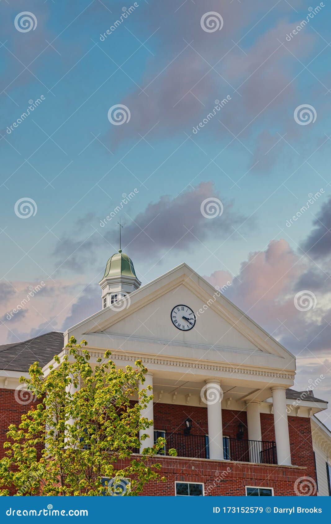 Clock on Face of Building at Dusk Stock Image - Image of building ...