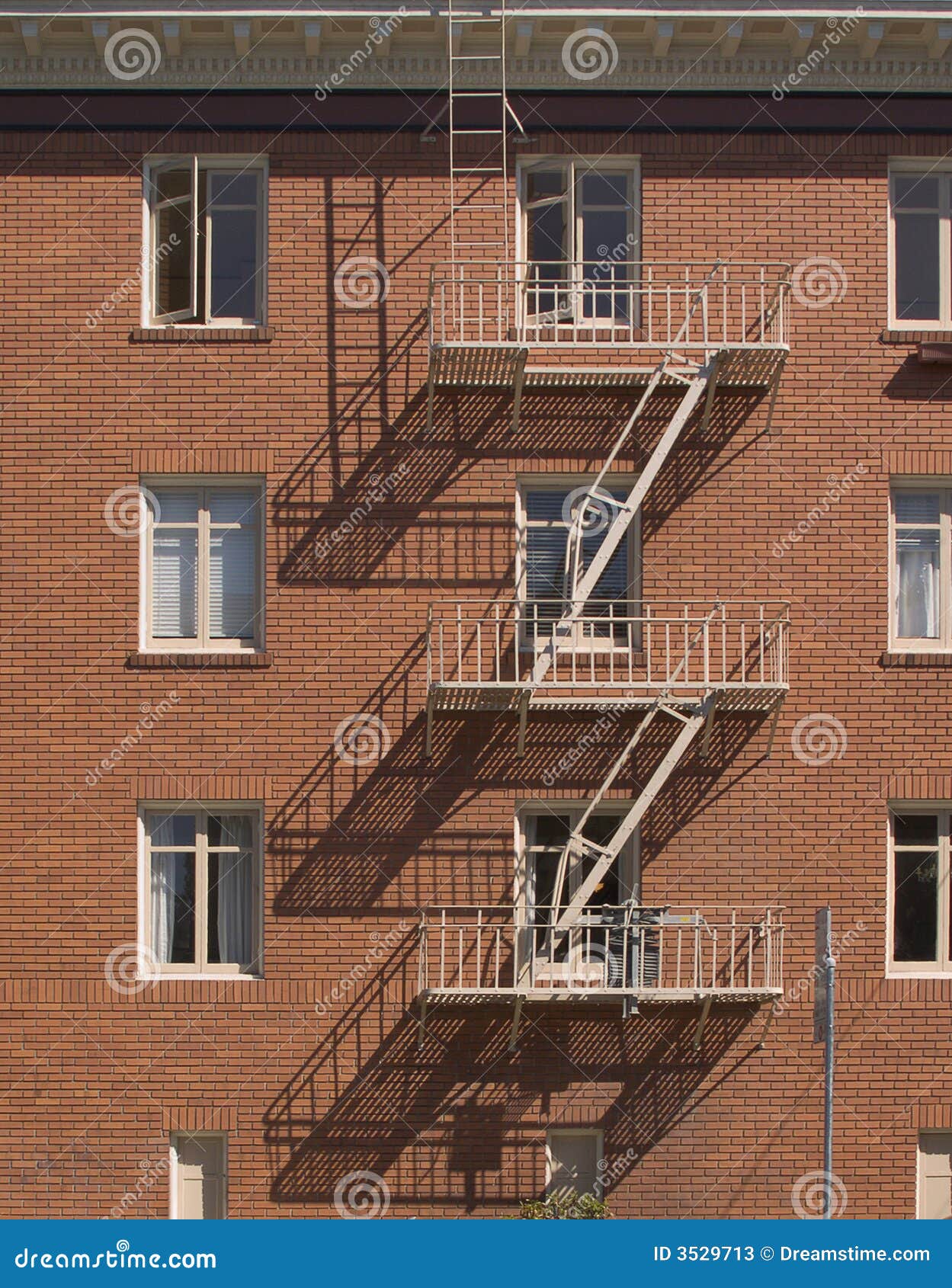 Brick Building and Fire Escape Stock Image - Image of condo, building ...