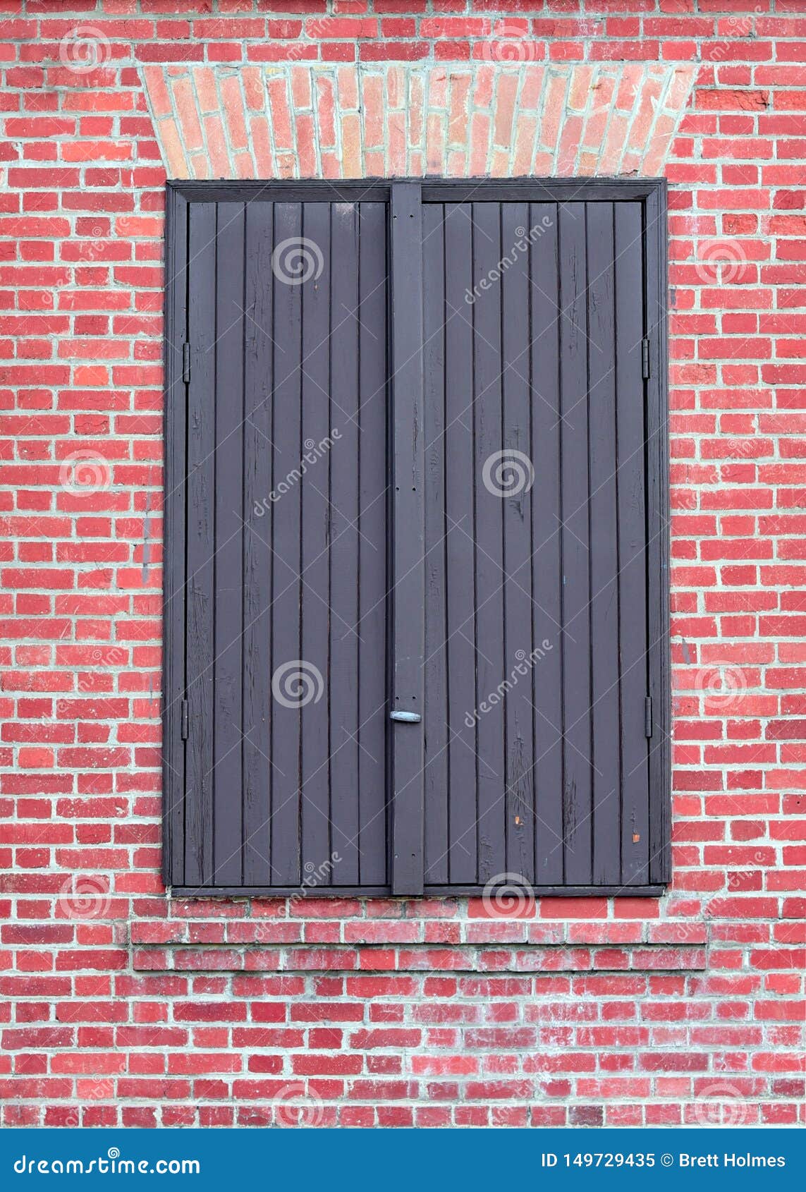 Brick Building with Shuttered Window Stock Image - Image of blocks ...