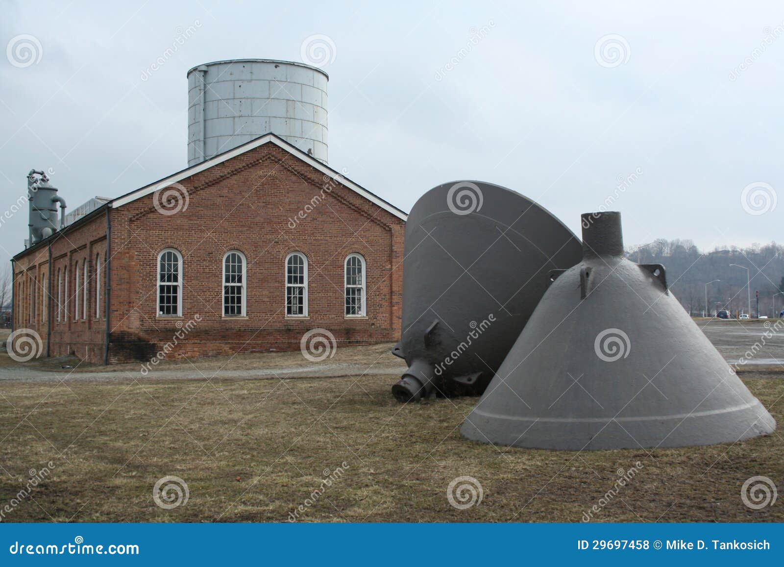 Brick Building & Steel Mill Bells Stock Photo - Image of heavy, brick ...