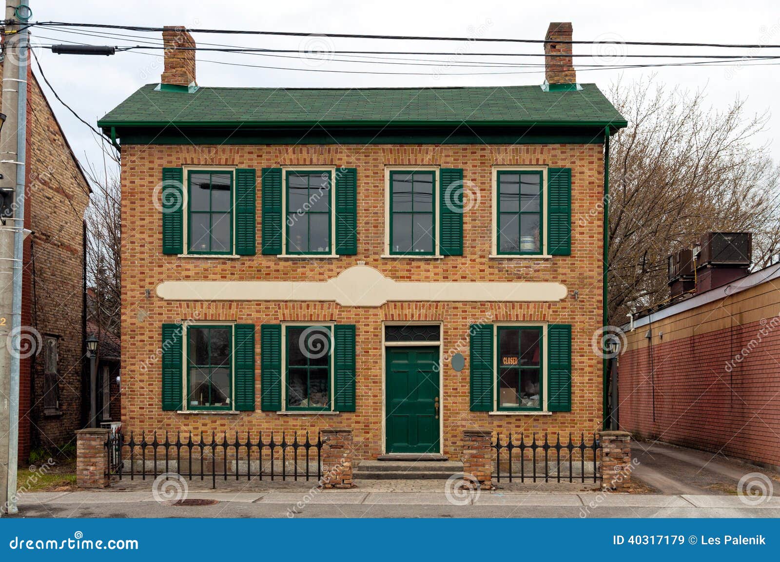Brick Building with a Store and Apartment Stock Image - Image of sign ...