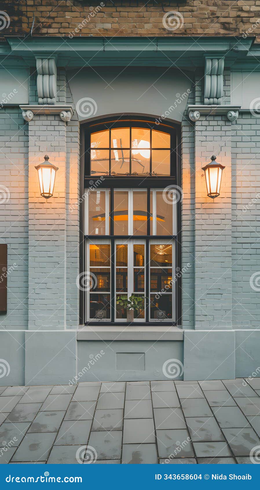 Brick Building with Warm, Inviting Glow Charming Urban Facade. Stock ...