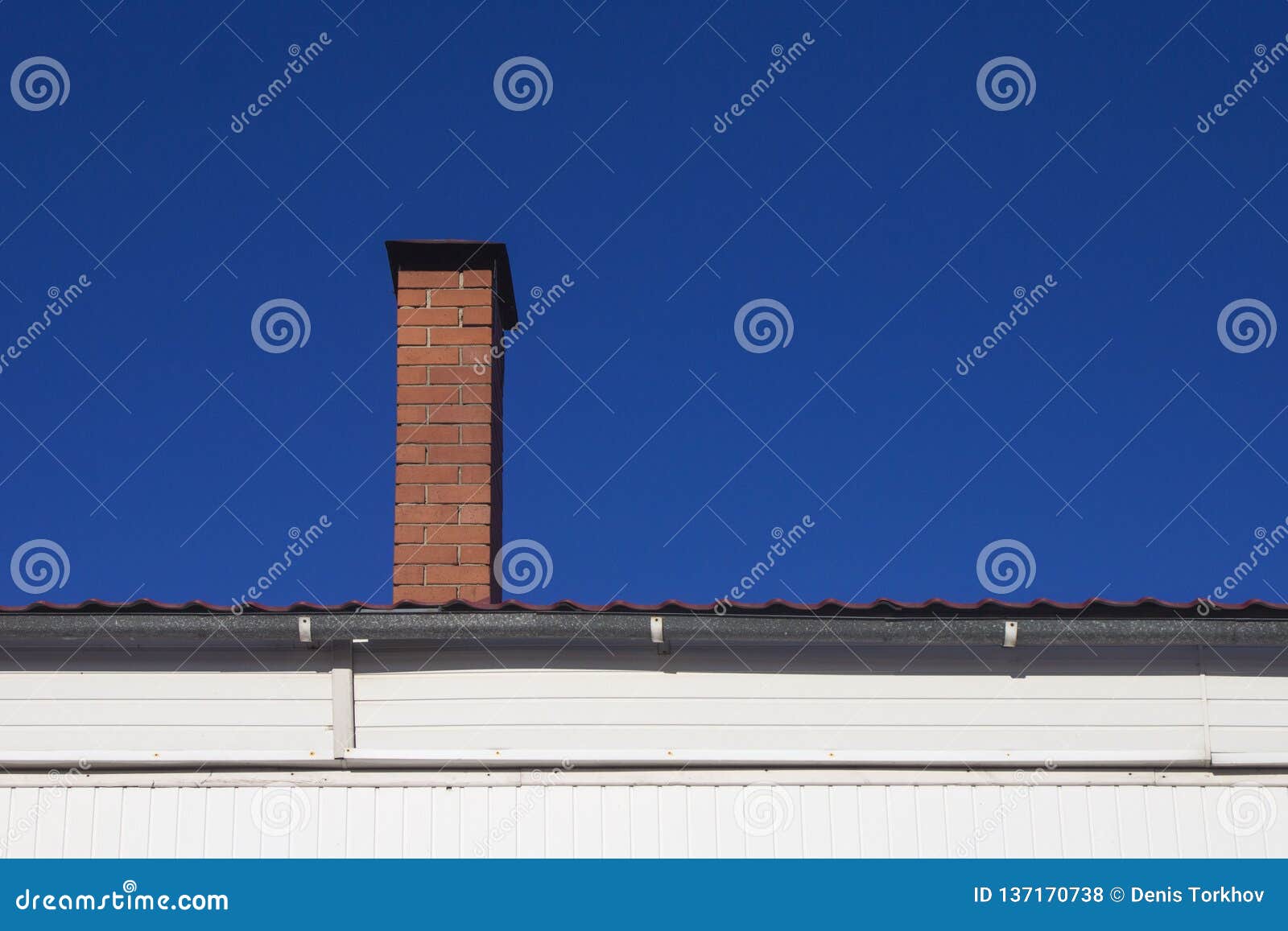 Brick Chimney Against the Blue Sky Stock Photo - Image of season, color ...