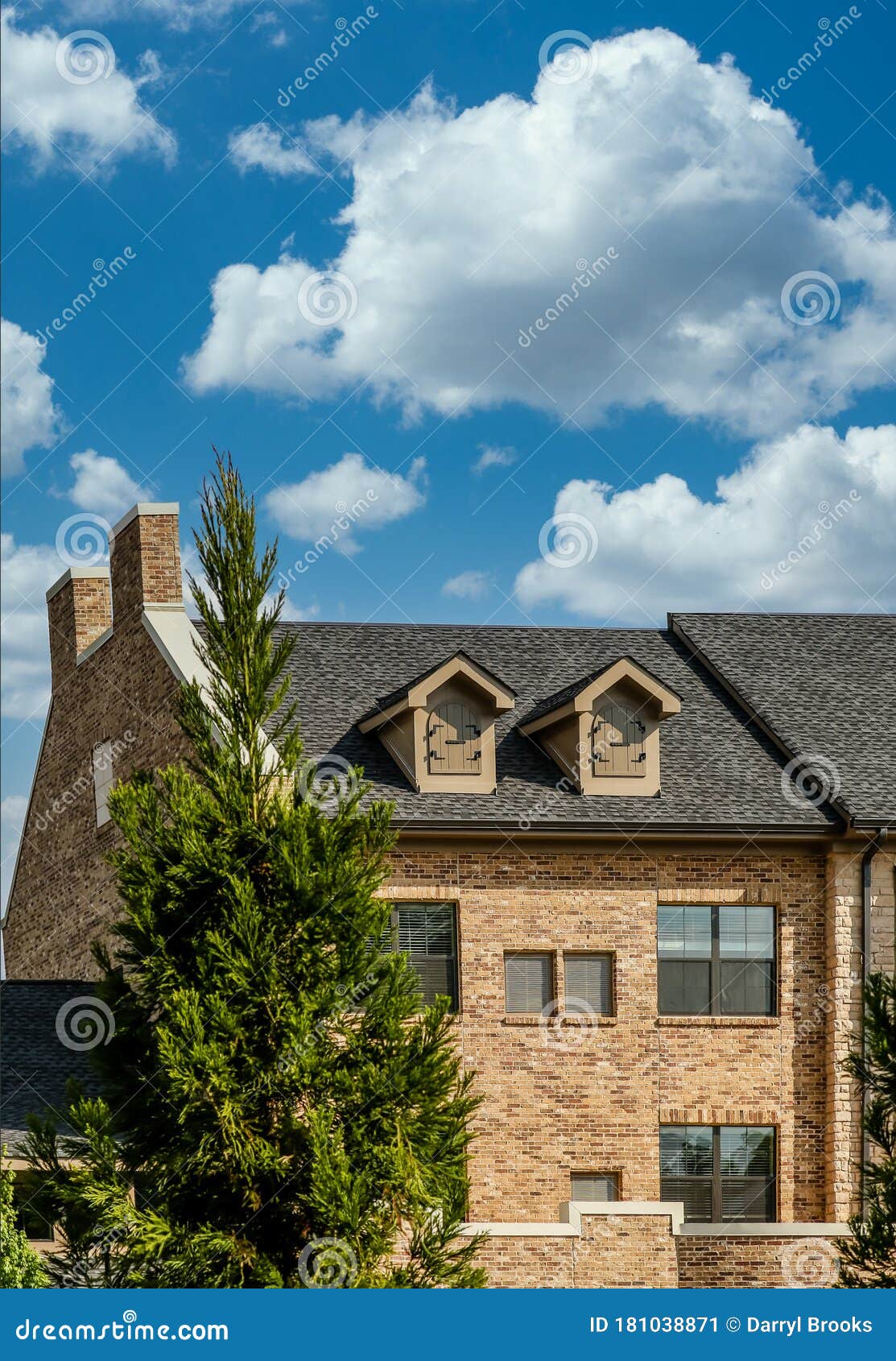 Red Brick Condos With White Balconies And Blue Windows Royalty-Free ...