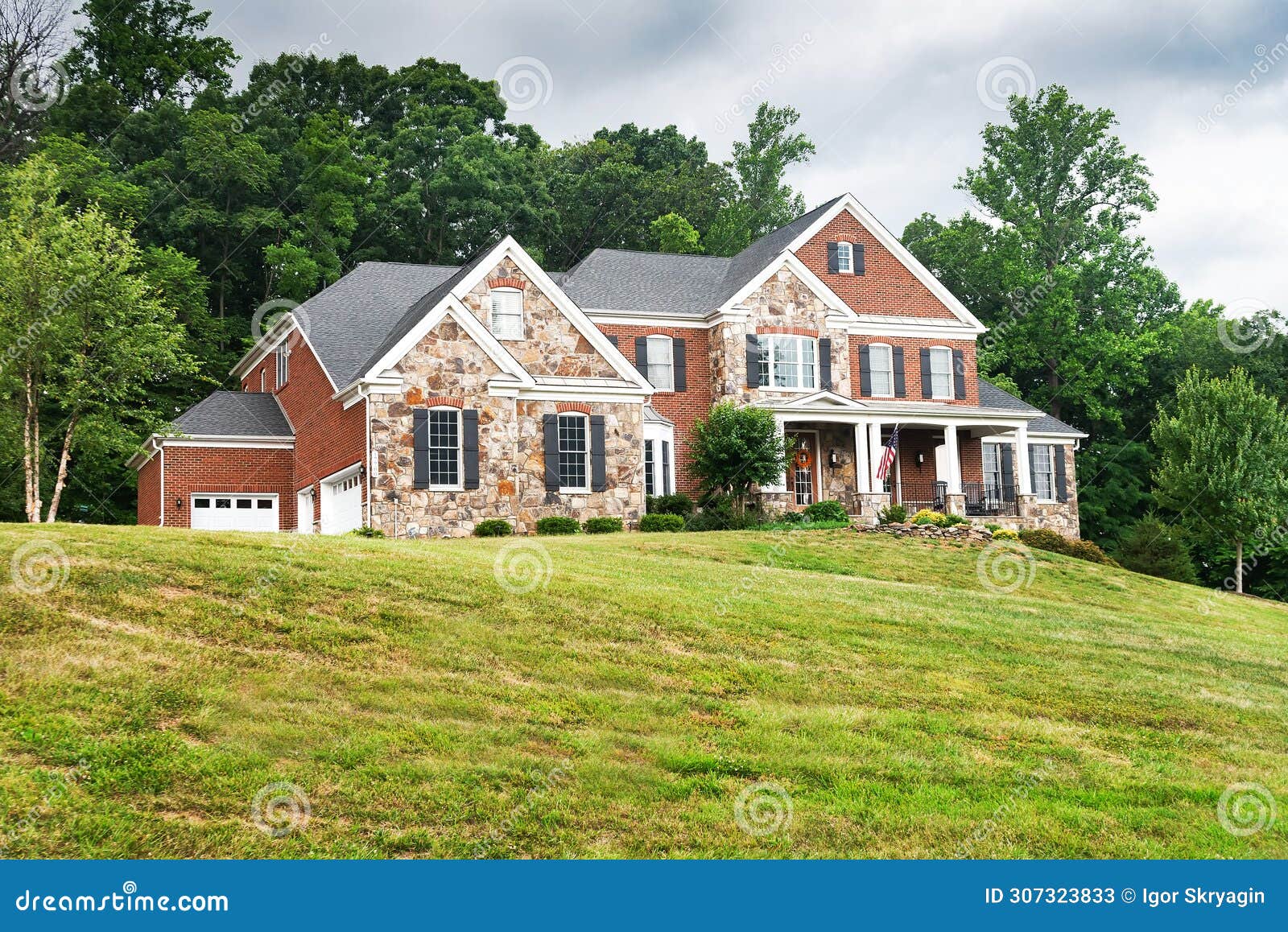 Brick Country House with a Large Lawn and Woods in the Backyard Stock ...