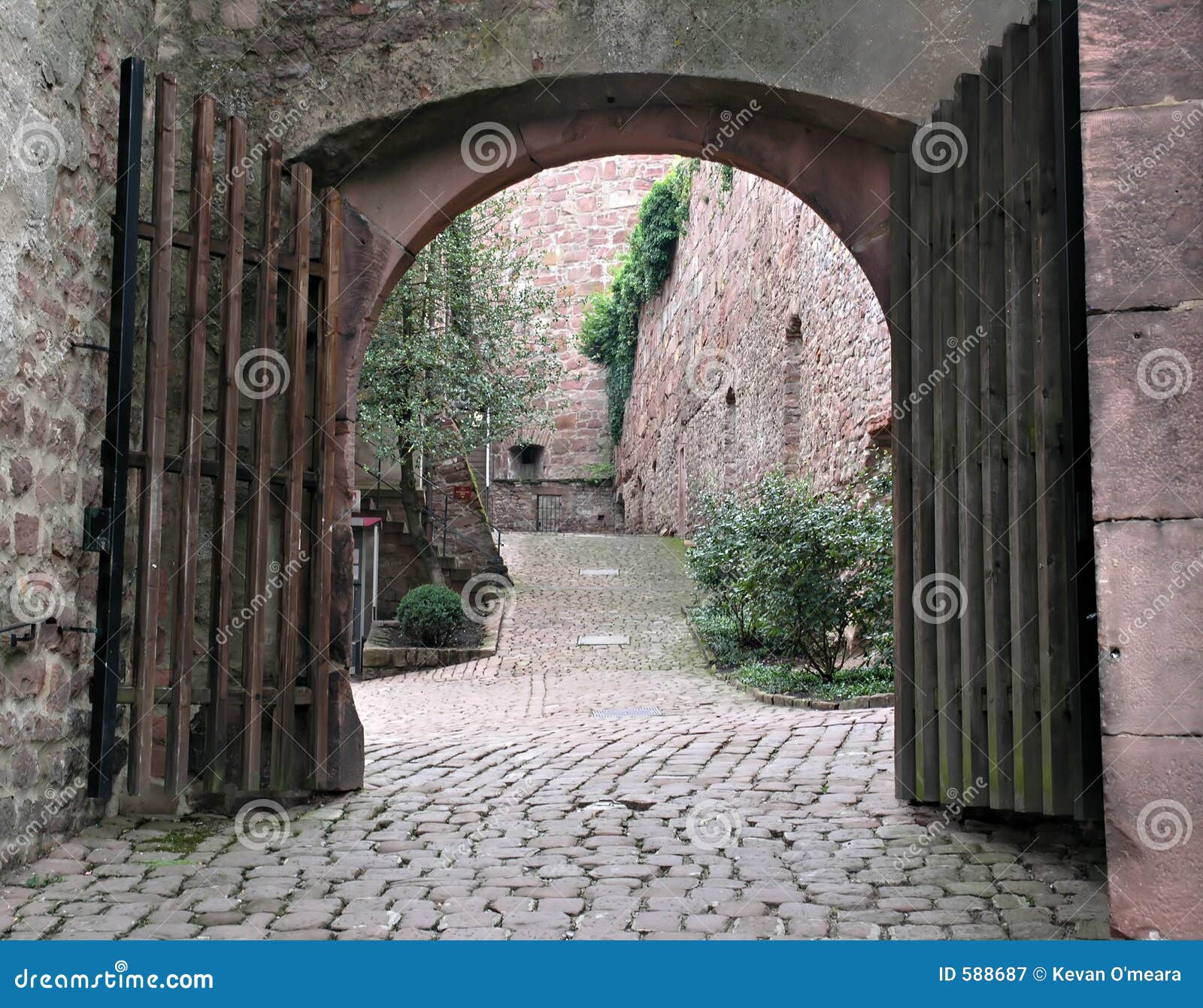 Brick courtyard arch stock image. Image of stone, peaceful - 588687