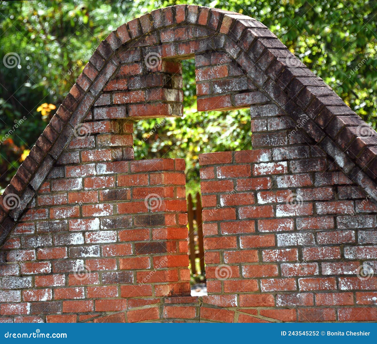 Brick Cross Shaped Opening in Arched Wall Stock Photo - Image of arched ...
