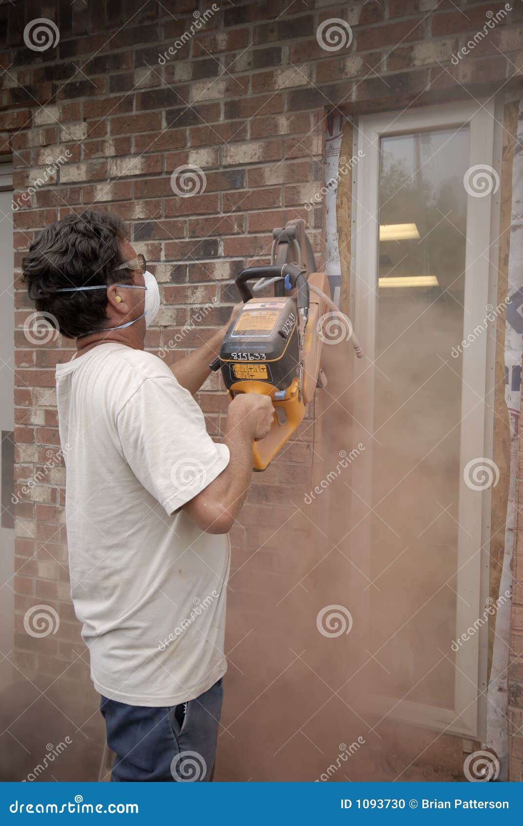 Brick Cutter stock photo. Image of bricks, sawing, dustmask - 1093730