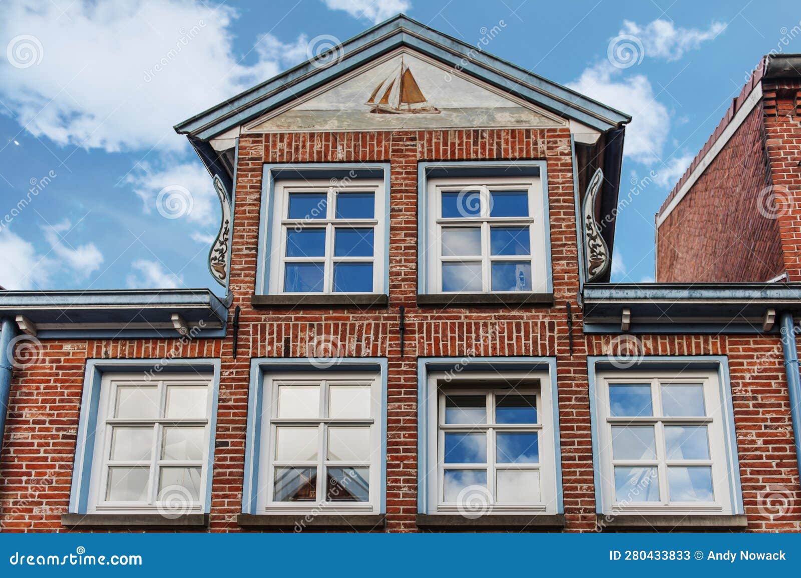 Brick Facade with Mansard Window Stock Image - Image of brown, outdoors ...