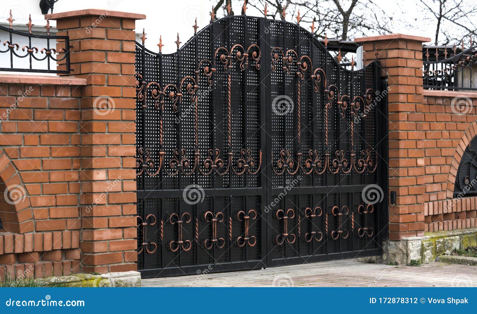 Brick Fence and Forged Gate Stock Photo - Image of landscape ...