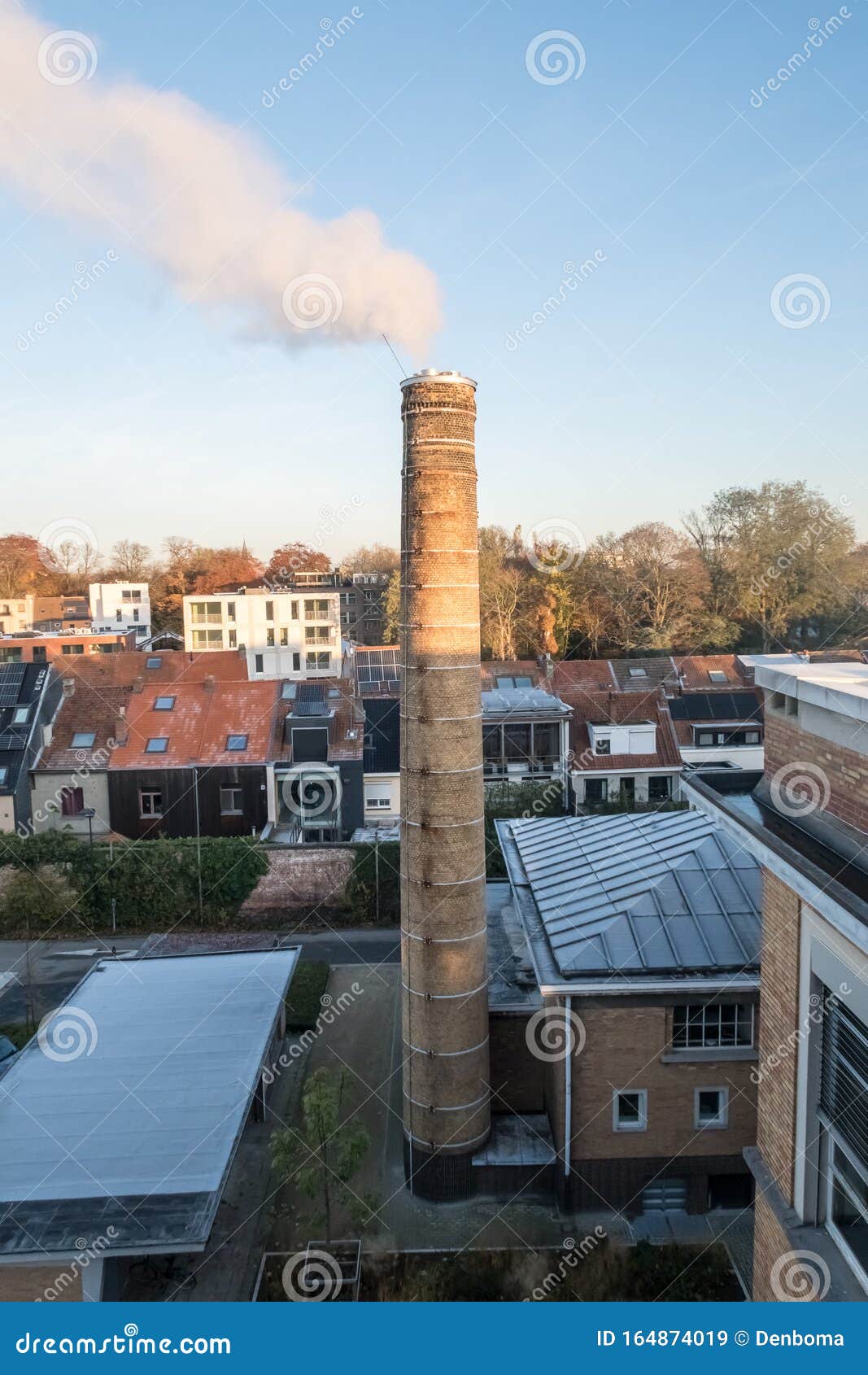 Brick fireplace with smoke stock image. Image of house - 164874019