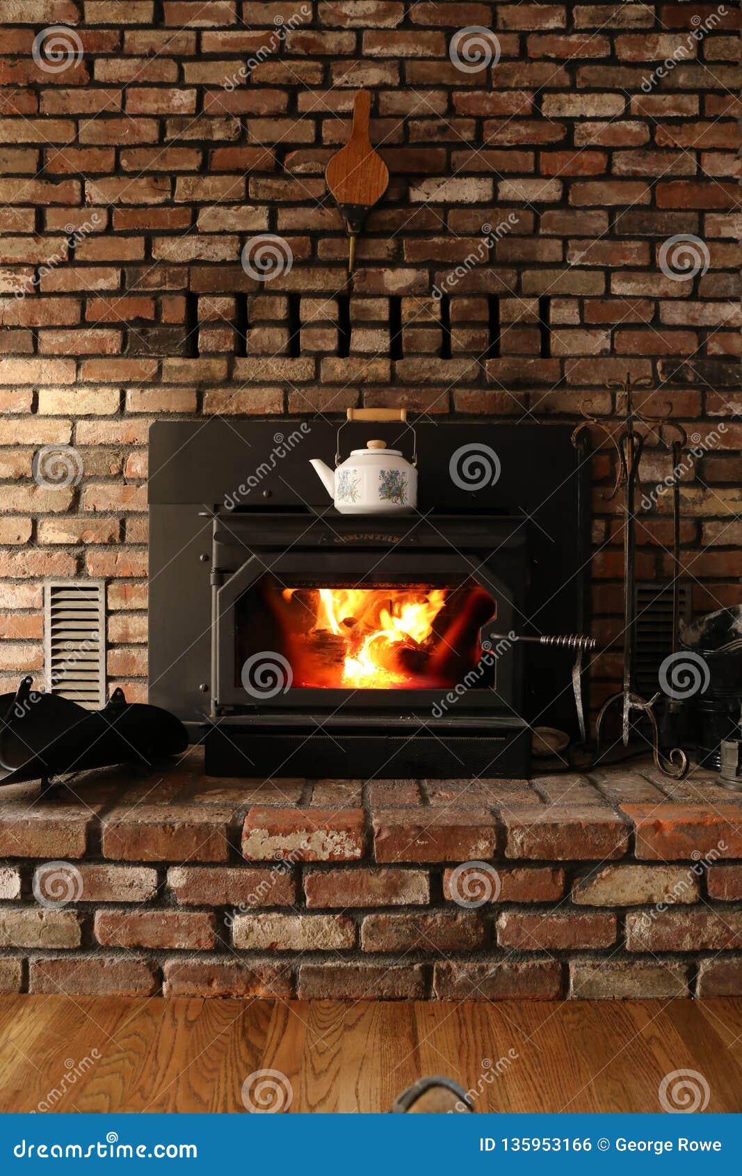 Brick Fireplace with Wood Fire Stock Photo - Image of fireplace ...