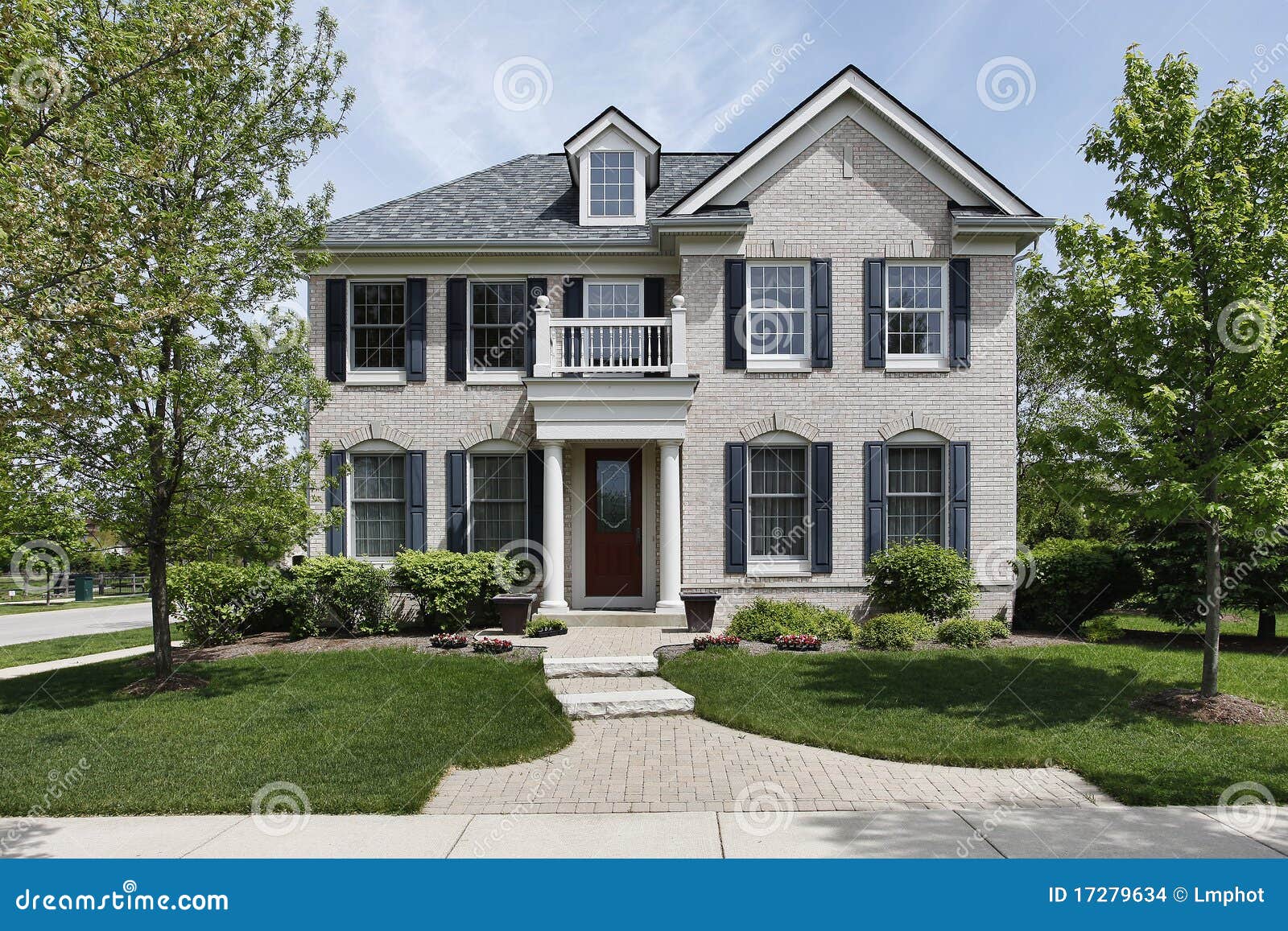 Brick Home with Front Balcony Stock Photo - Image of estate ...