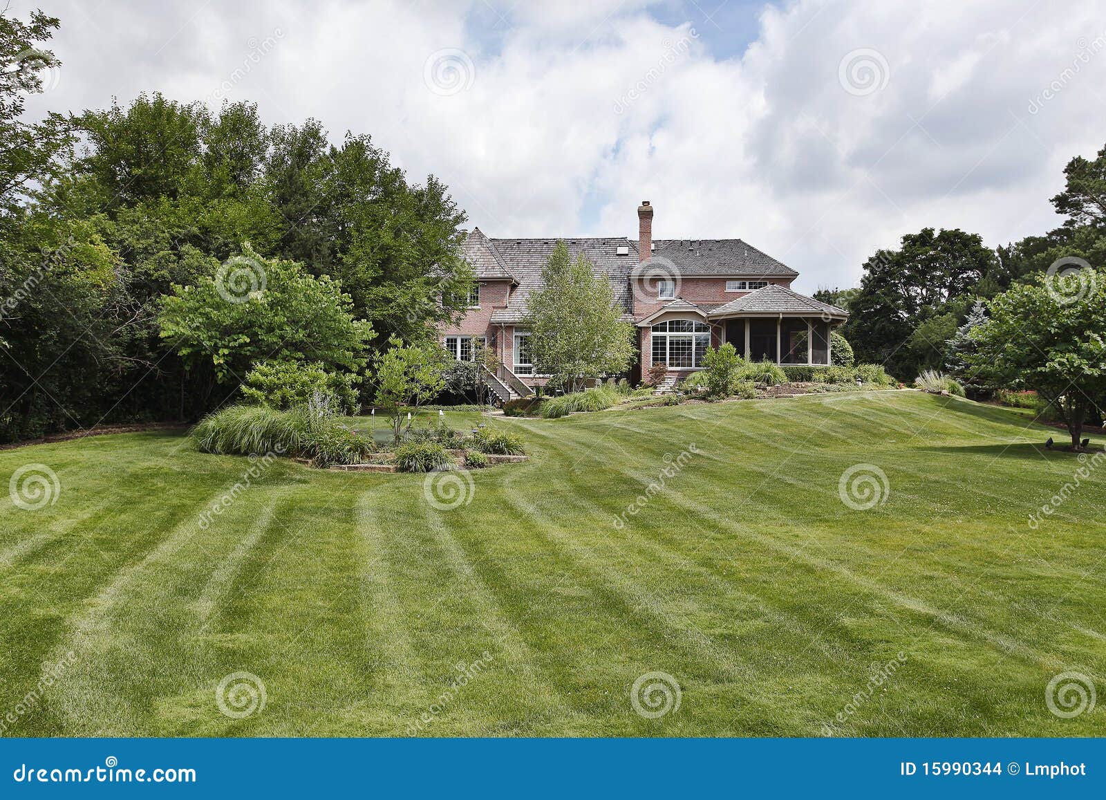 Brick Home with Large Back Yard Stock Photo - Image of modern, large ...
