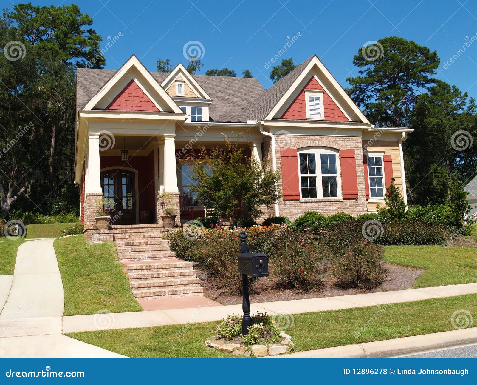 Brick Home with Porch and Gables Stock Photo - Image of family ...