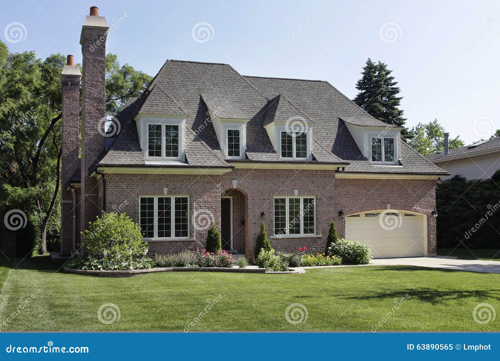 Brick Home with Two Chimneys Stock Image - Image of lawn, dwelling ...