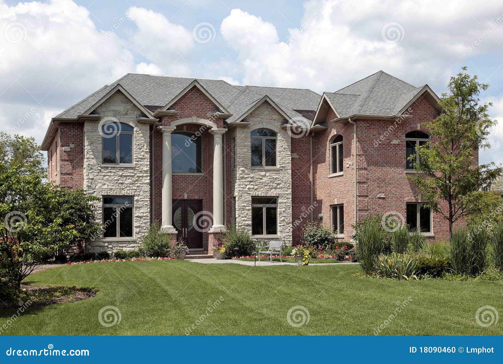 Brick Home with White Columns Stock Photo - Image of lawn, driveway ...