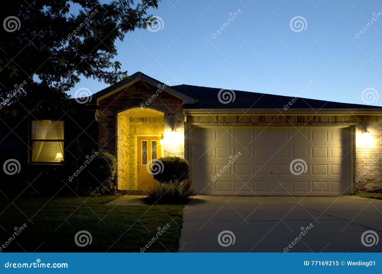 A brick house at night stock image. Image of lighted - 77169215
