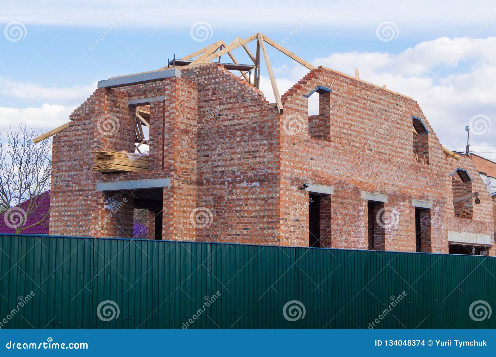 Brick House Under Construction with Unfinished Roof Stock Photo - Image ...