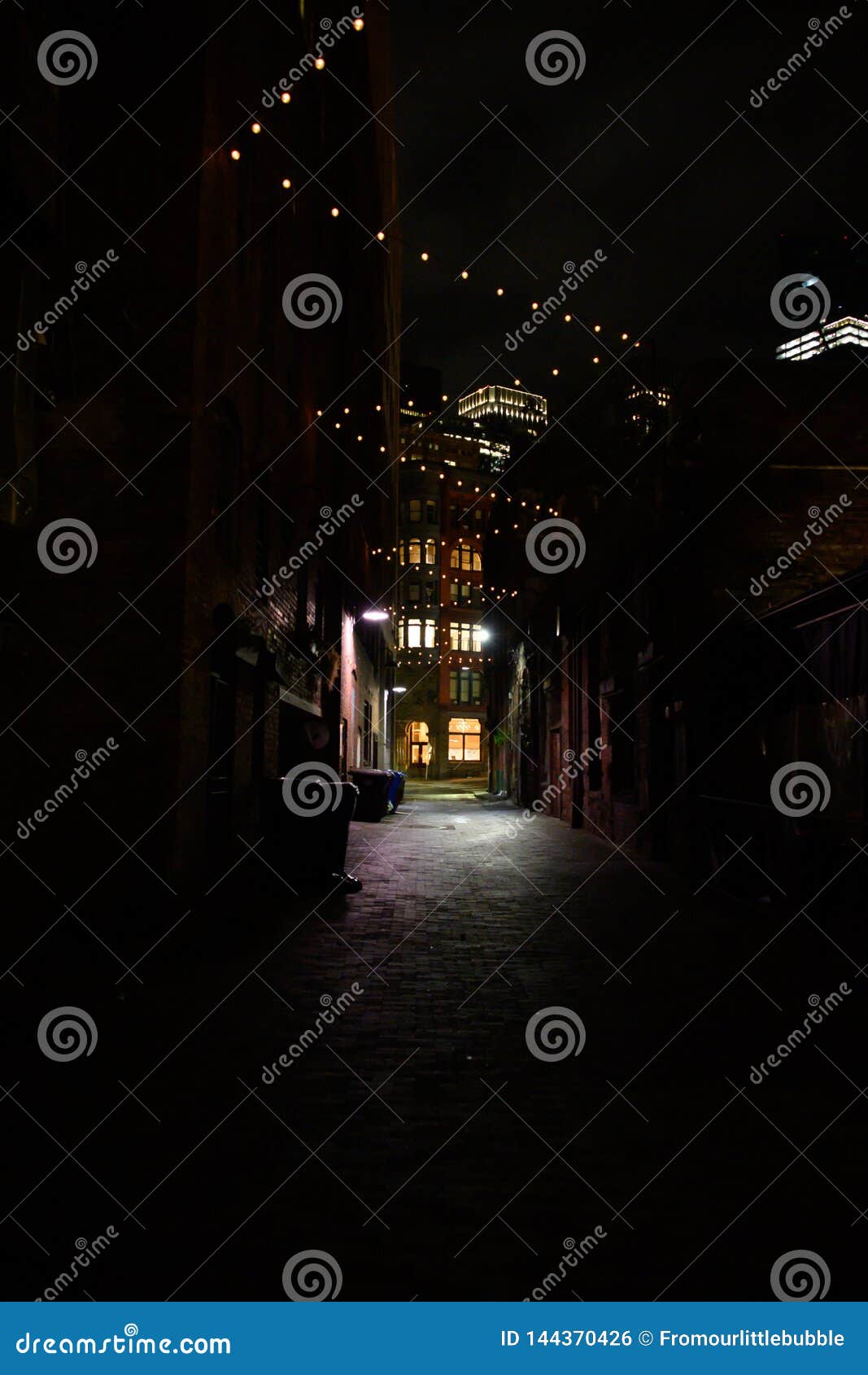 Dark urban Alley at night stock photo. Image of late - 144370426