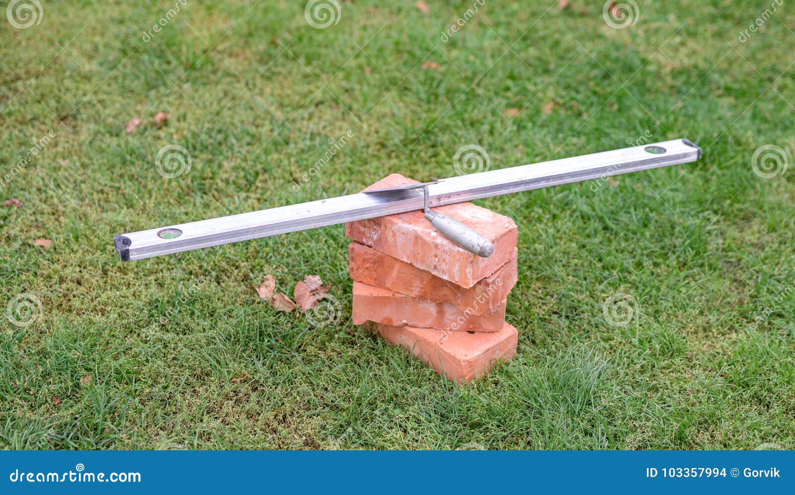 Brick and Measuring Level and Spatula Stock Photo - Image of outside ...