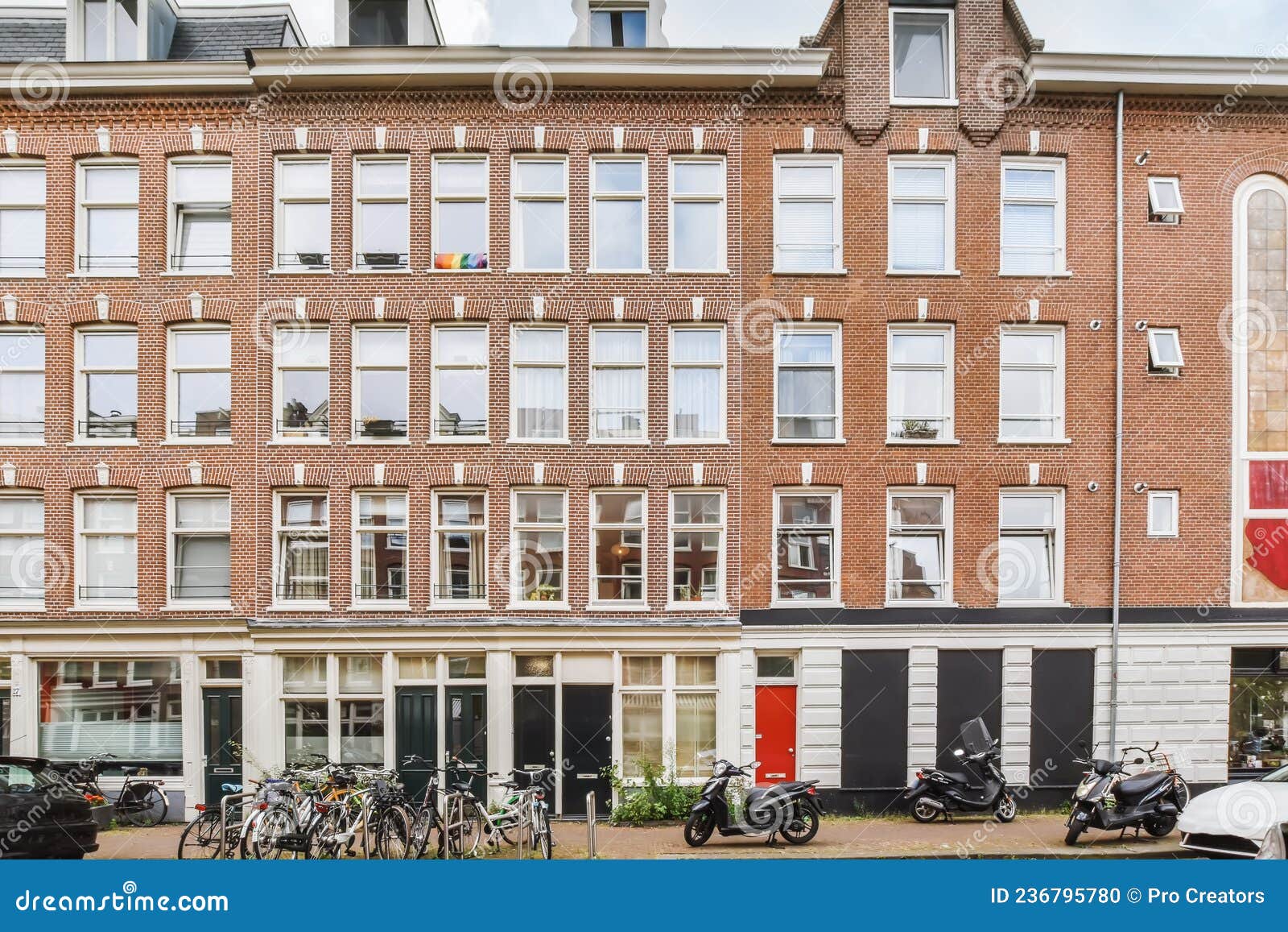 Brick Multi-storey Building Stock Photo - Image of estate, street ...