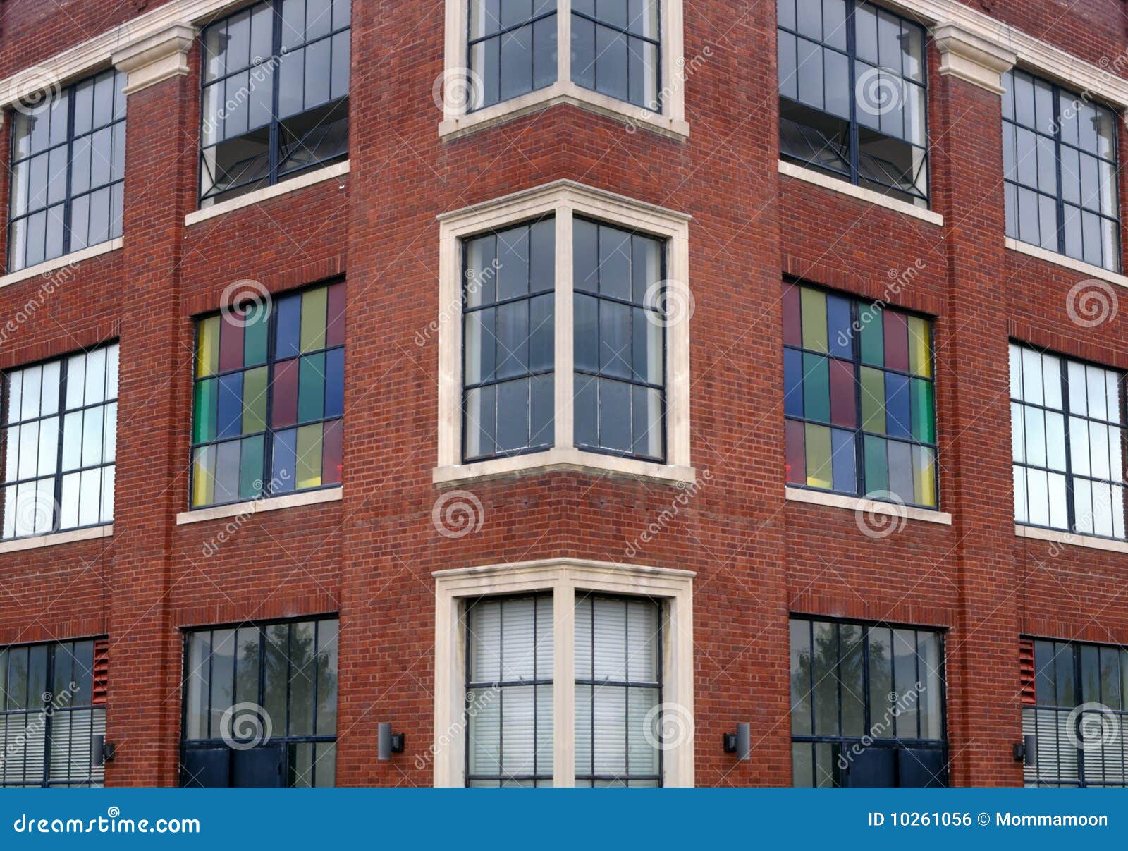 Brick Office Building With Prominent Stone Quoin Blocks And Carved ...
