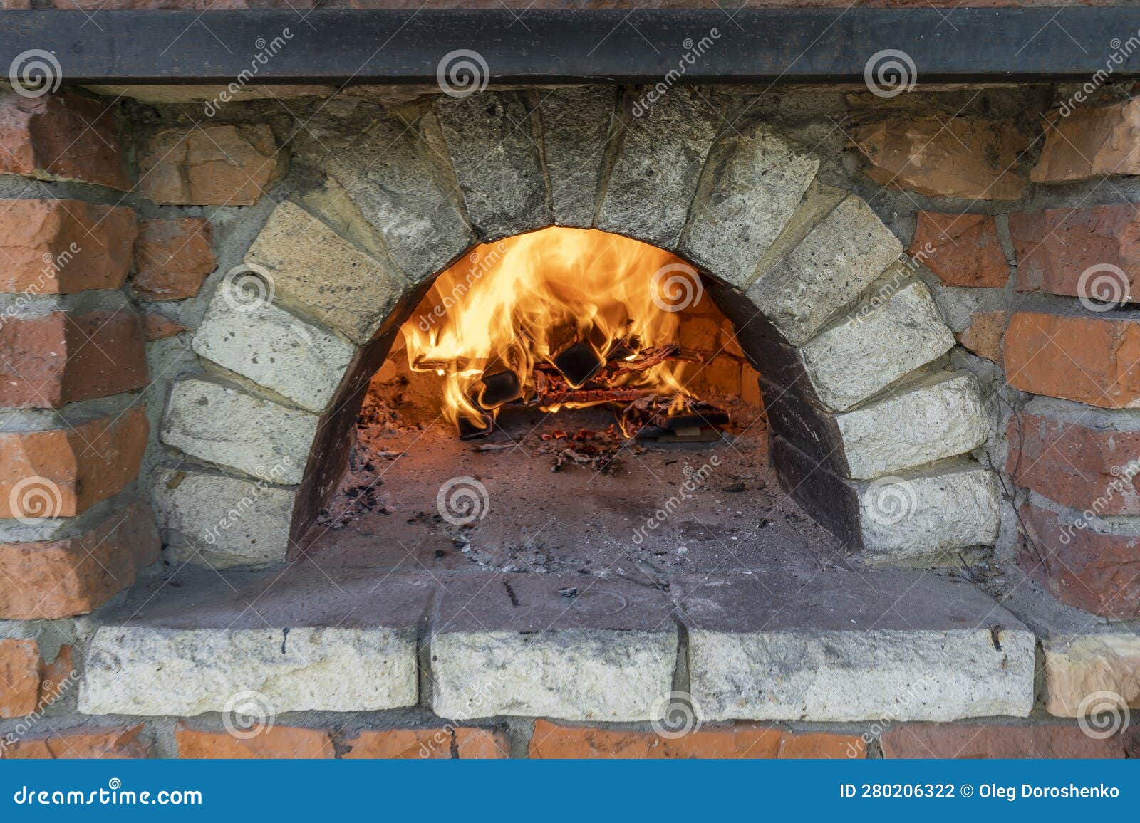 Brick Oven for Cooking. Burning Fire in Stone Oven, Closeup Stock Photo ...