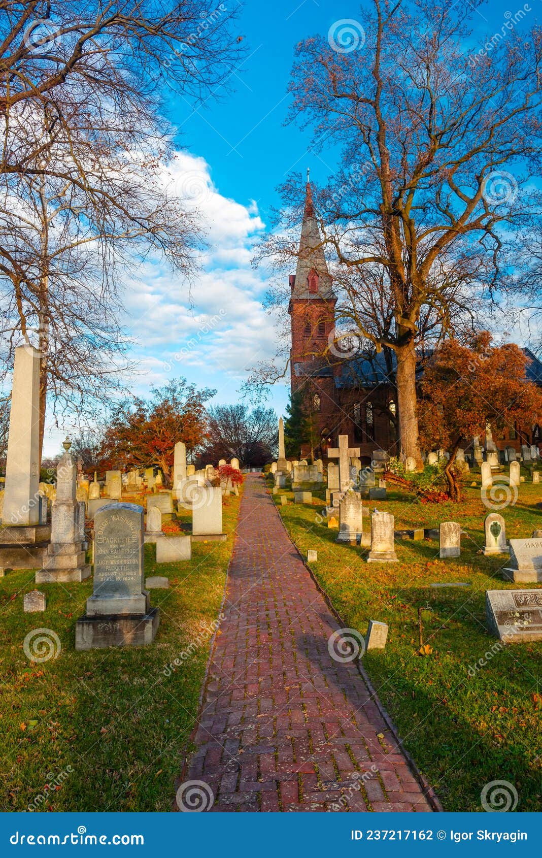 Brick Path between the Graves in the Cemetery Editorial Photography ...