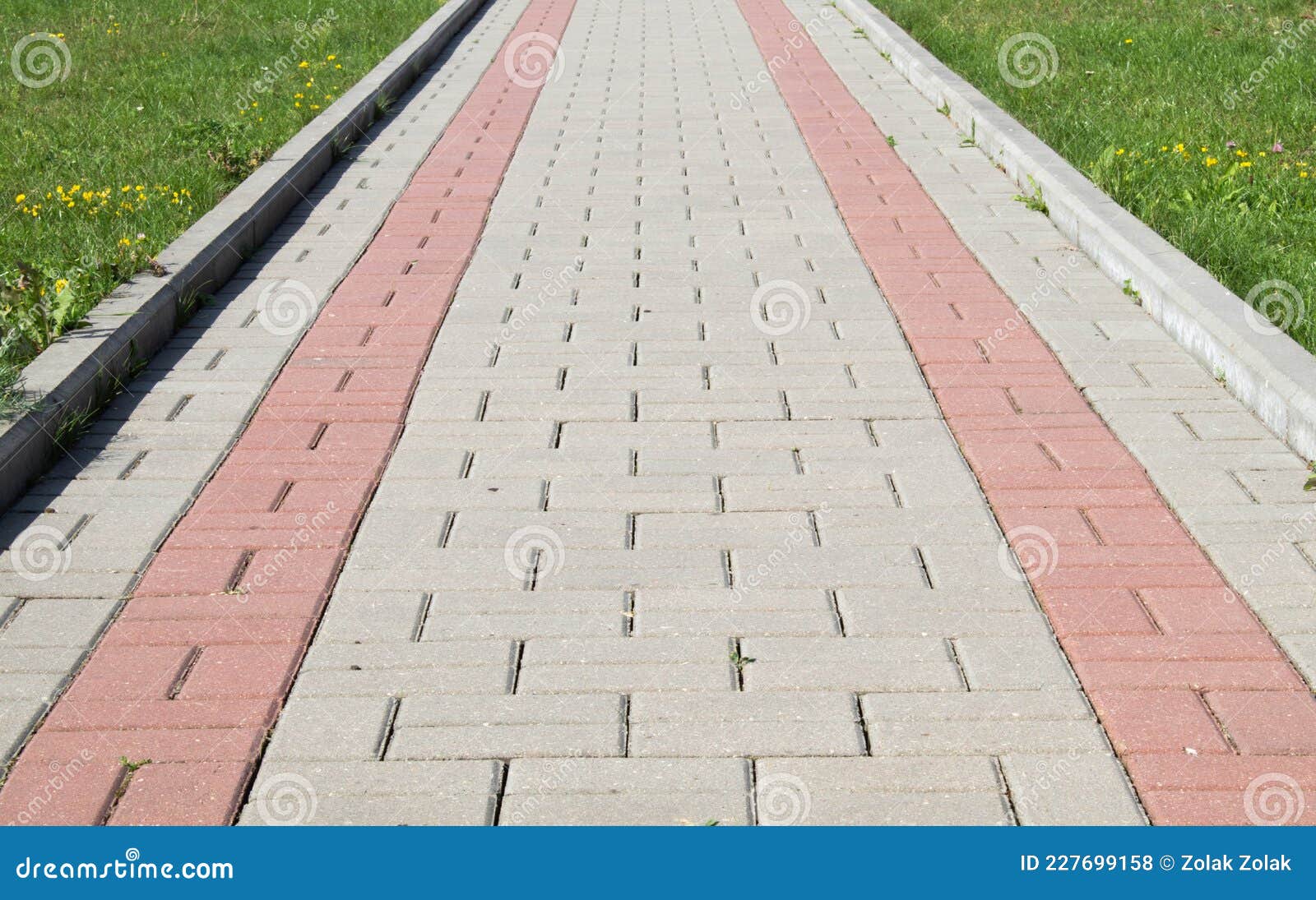 The Path Of The Sidewalk Is Interrupted By Excavation Of A Gutter For ...