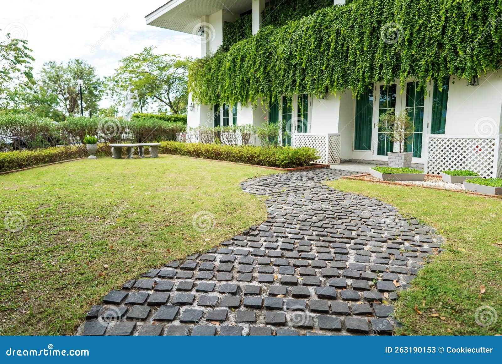 A Brick Paved Road Stretches into the Garden Stock Image - Image of ...