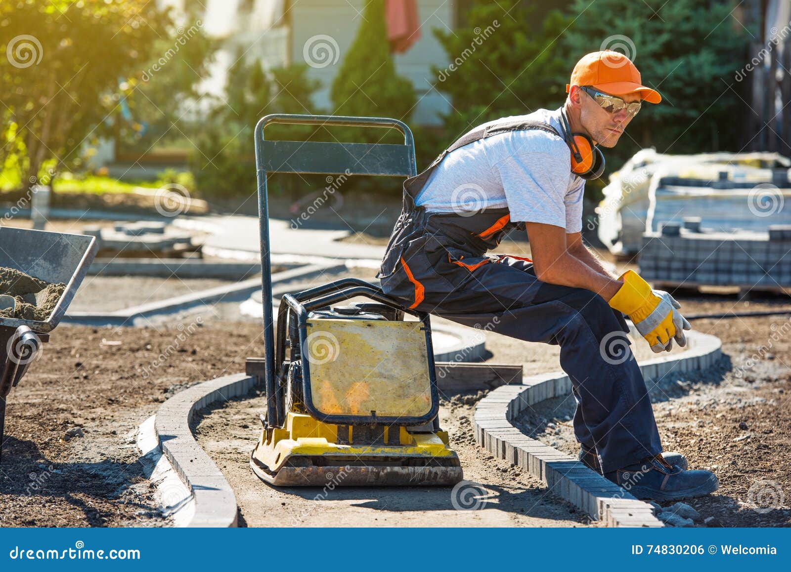 Brick Paver Worker stock photo. Image of professional - 74830206