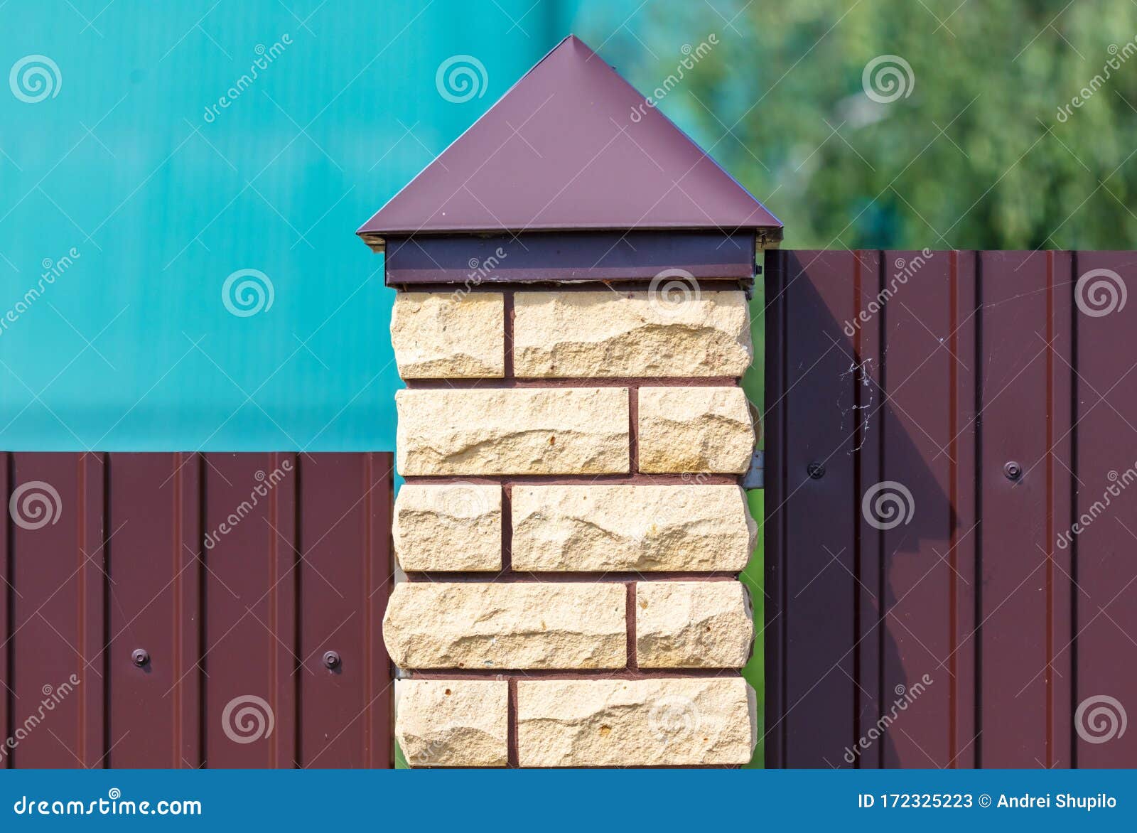 Brick pillar on the fence stock image. Image of iron - 172325223