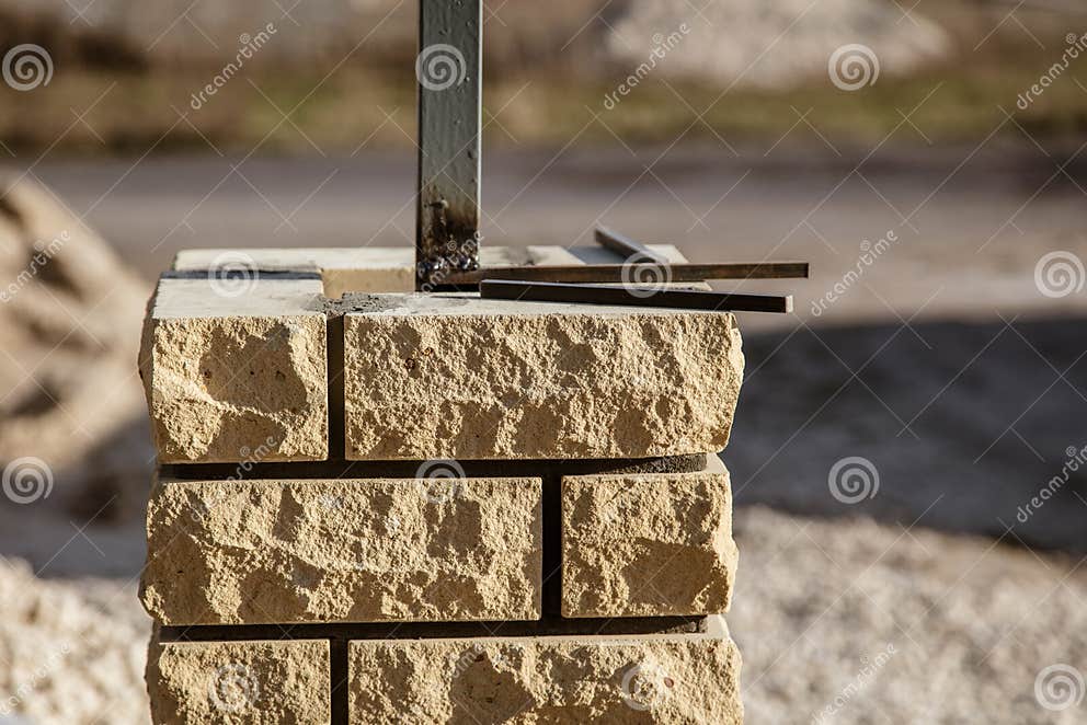 Brick Posts on a Fence As a Background Stock Photo - Image of masonry ...