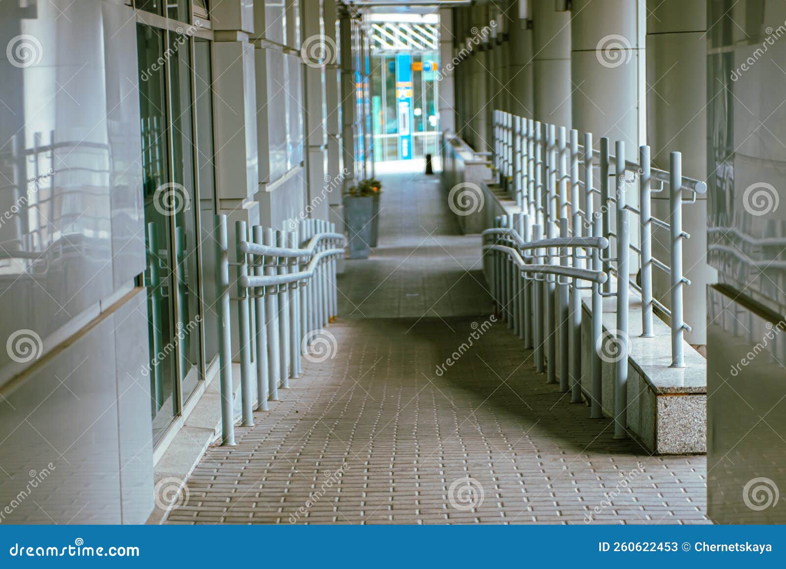Brick Ramp with Shiny Metal Railings Inside Stock Image - Image of ...