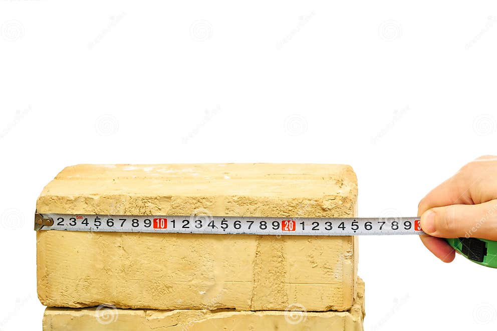 Brick and Ruler Isolated on White Stock Photo - Image of closeup ...