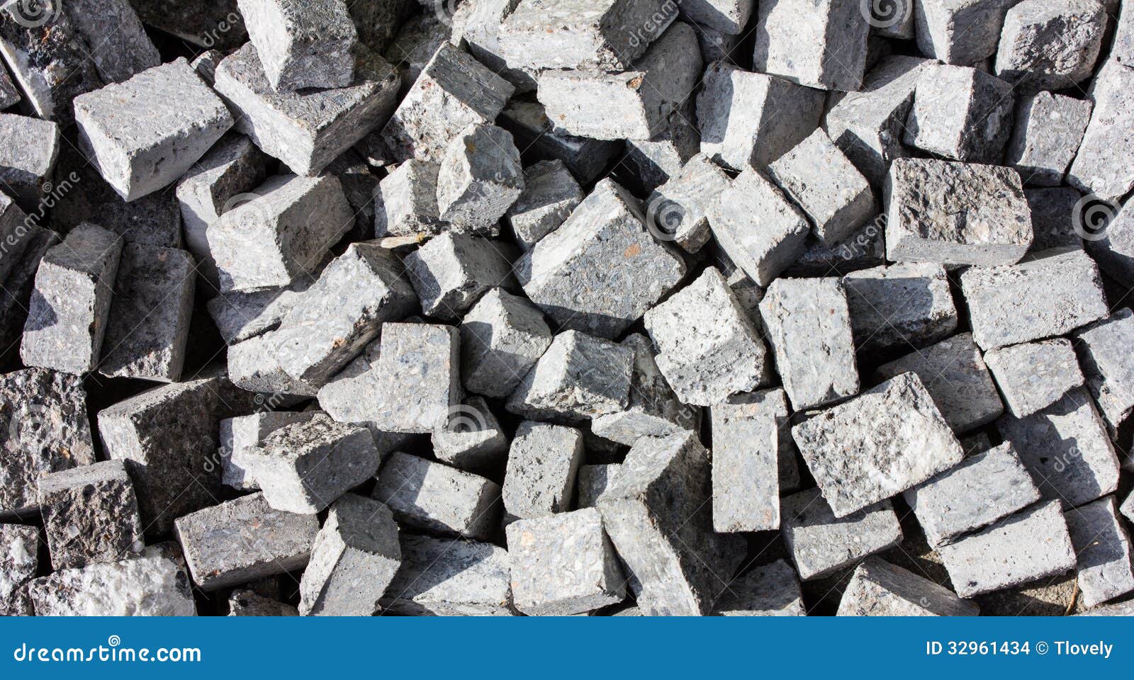 Square Stack Of Pipes With A Golden Sun Setting Behind A Mountain In ...