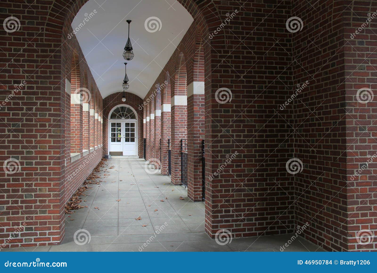 Brick and Stone Hallway with Arched Doorways Stock Photo - Image of ...