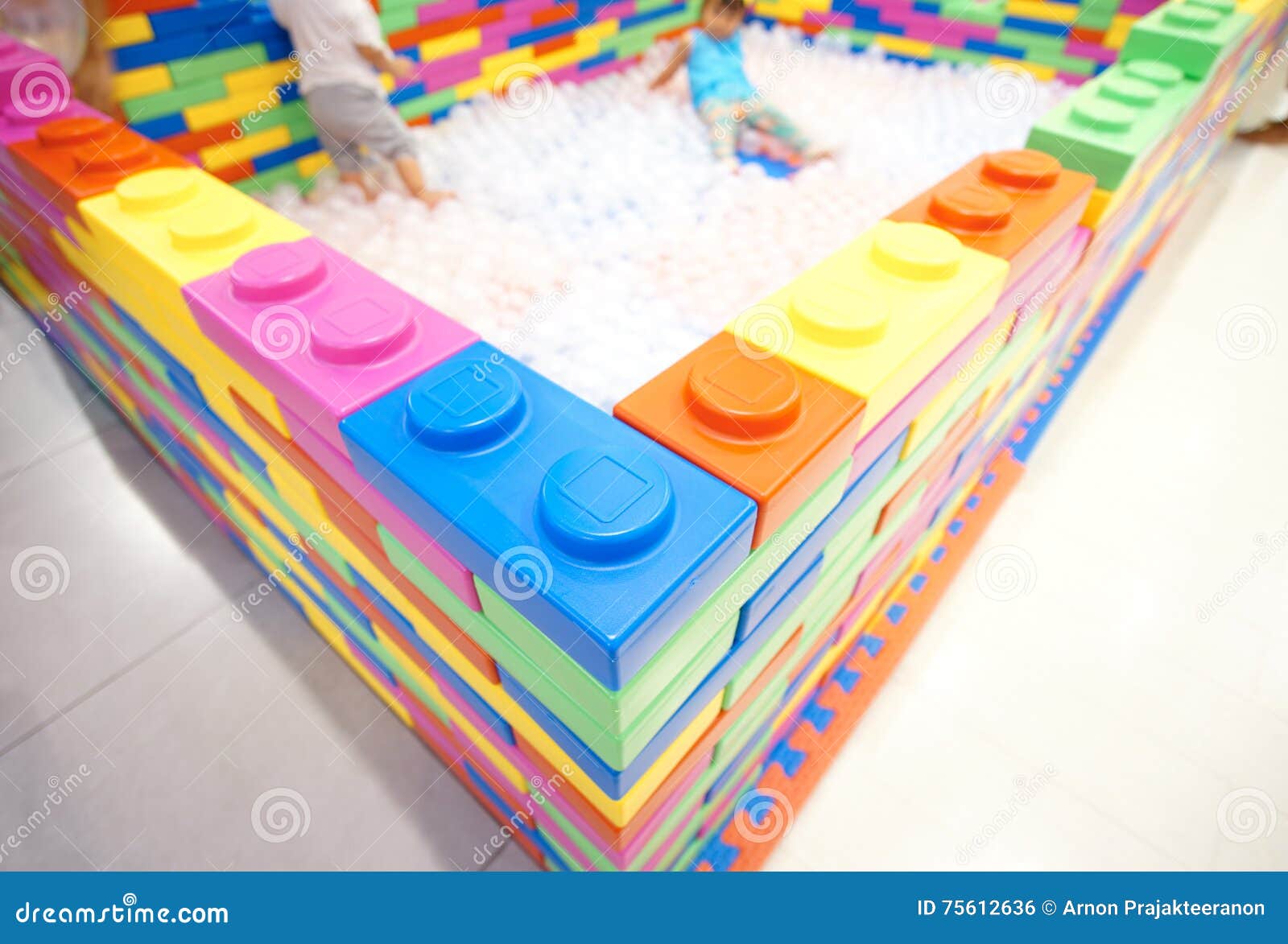 Brick toy with playground stock photo. Image of family - 75612636
