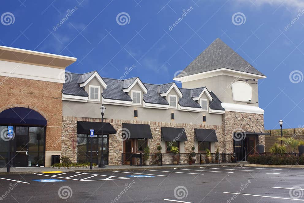 Brick upscale strip mall stock image. Image of business - 8596013